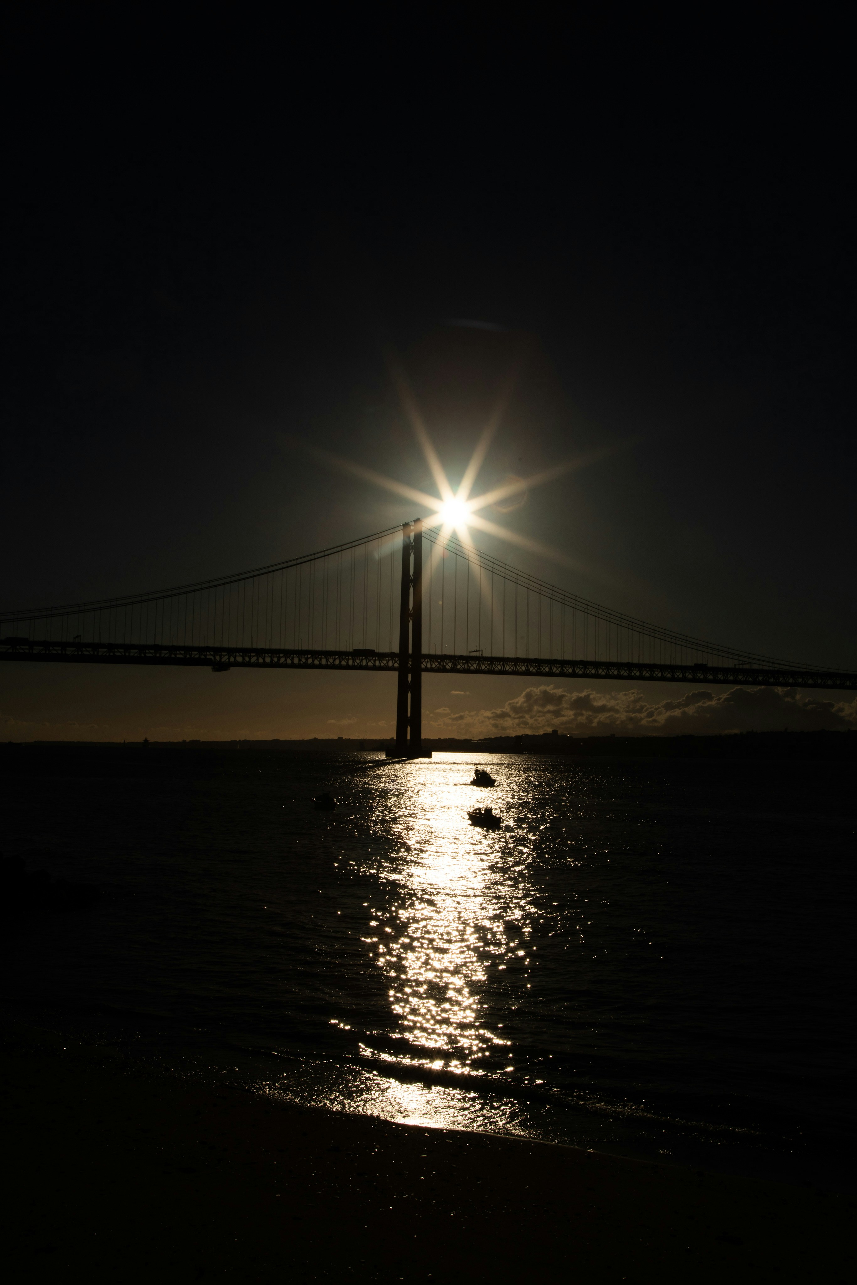 Sunlit Span: Night Bridge Reflections on Quiet Water