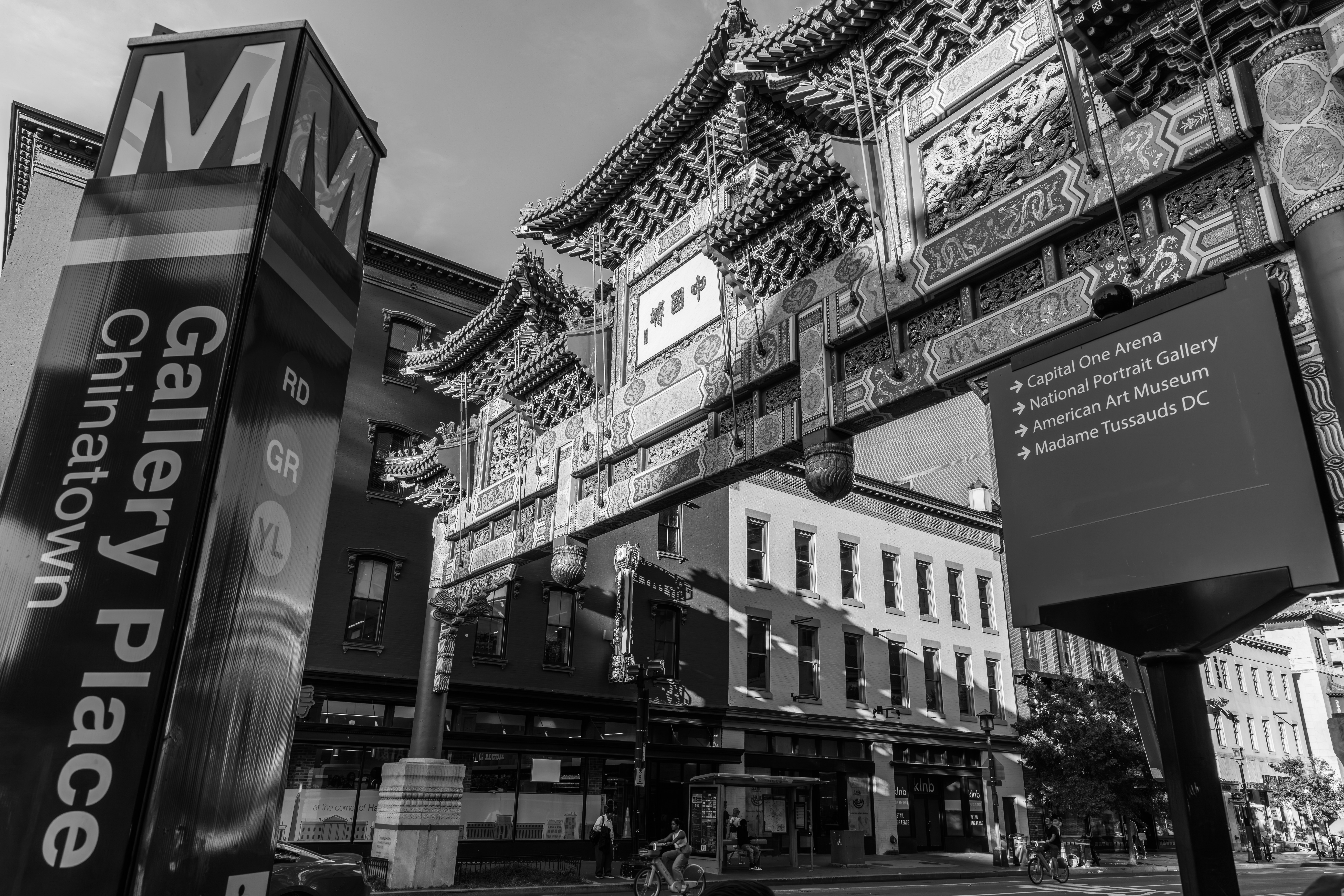 City Gateways: A Black-and-White Street Vista of Chinatown Entrance