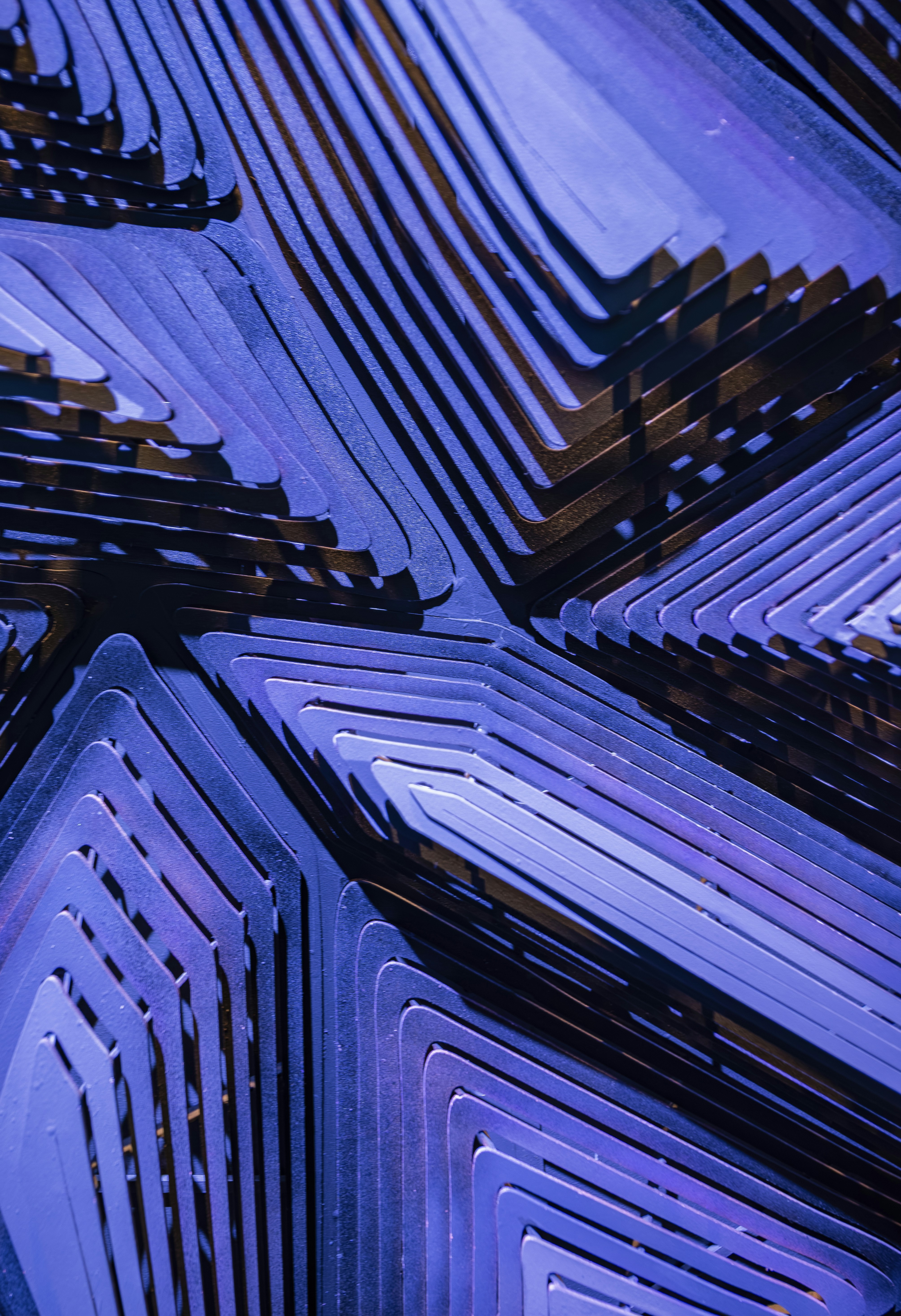 Chromatic Stacks: Geometric Layers in Indigo Light