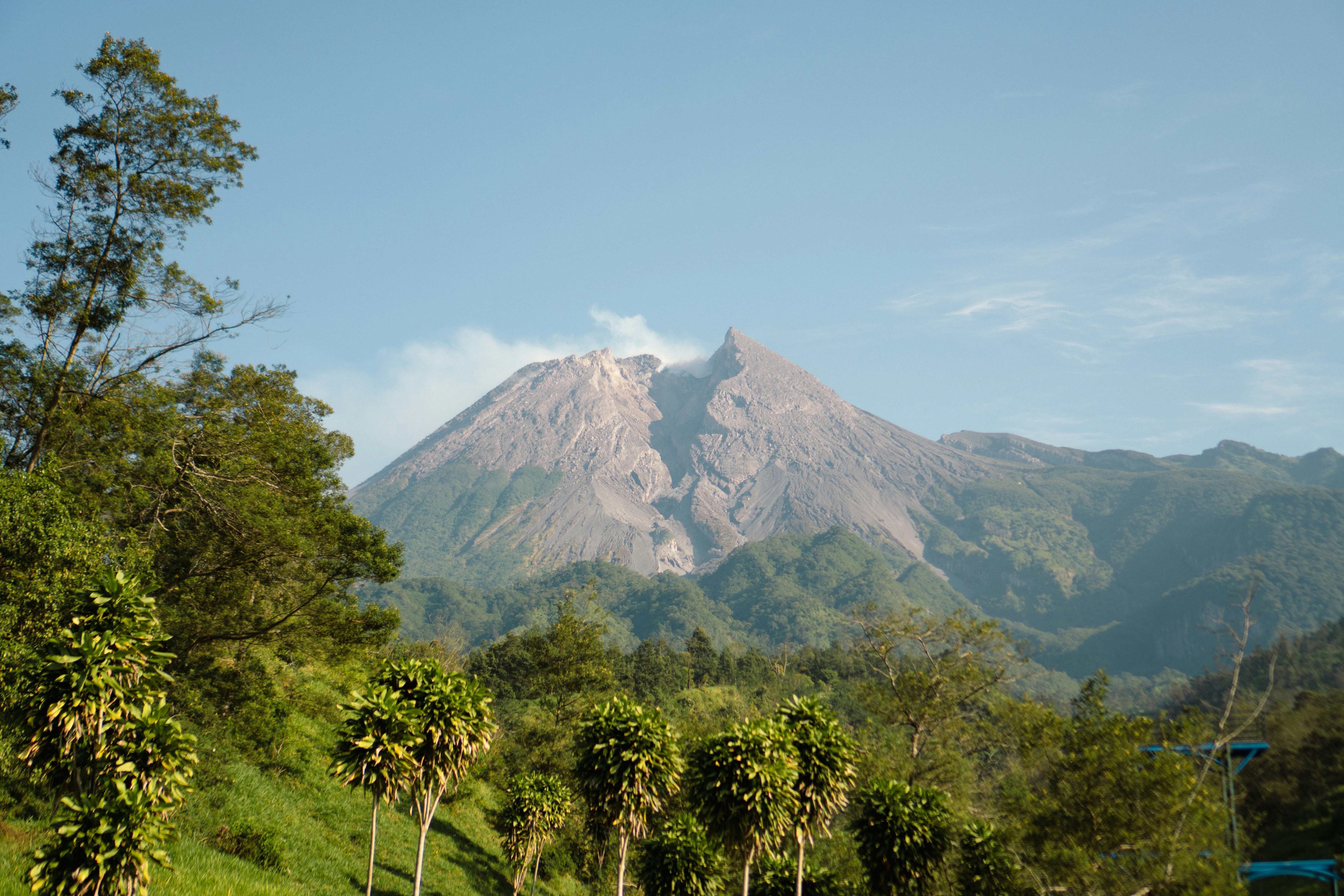 Cone of the Peak: Sunrise over a Verdant Valley