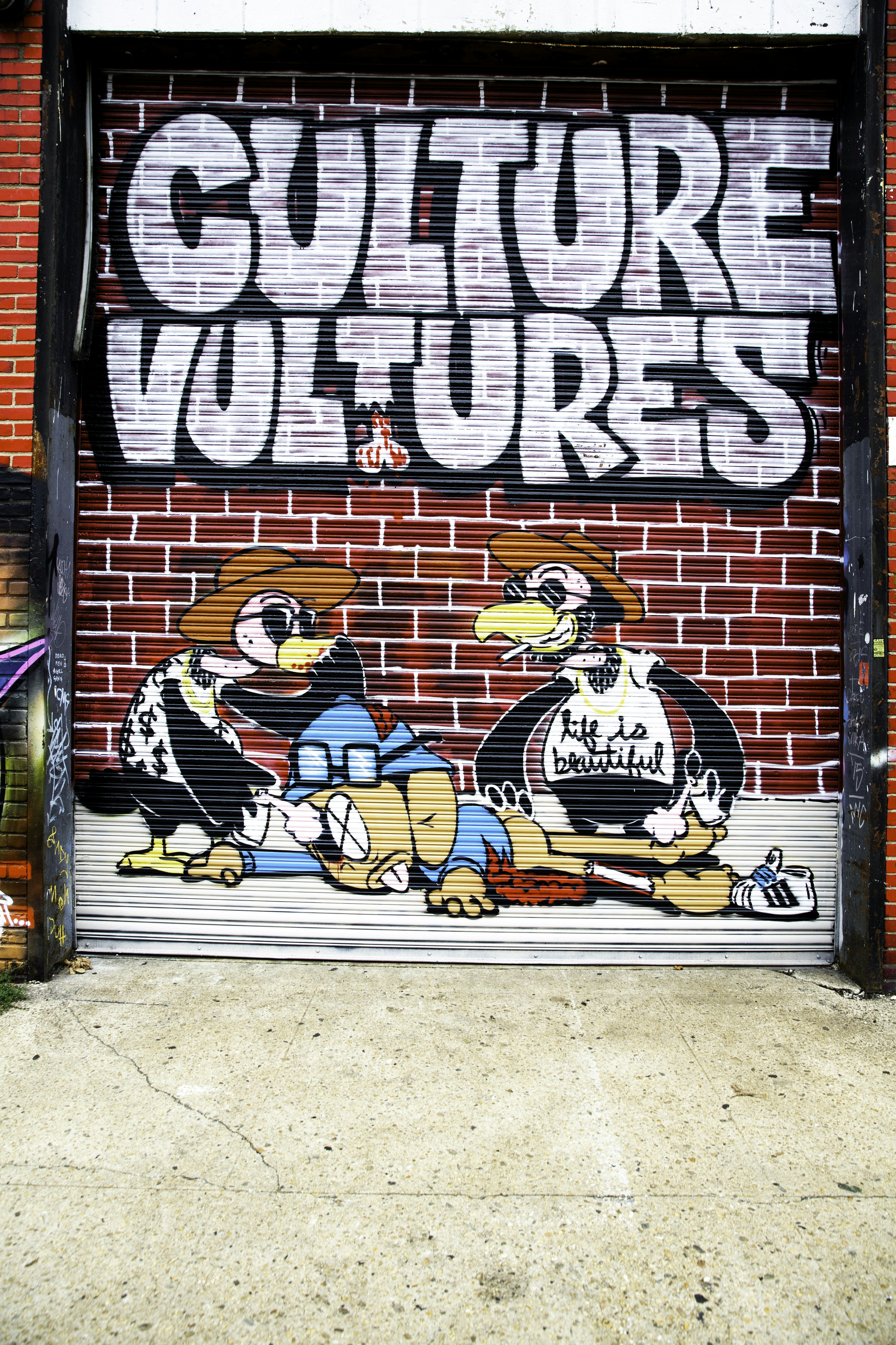 Culture Vulture: Graffiti Mural of Cardboard Gang and Bold Letters