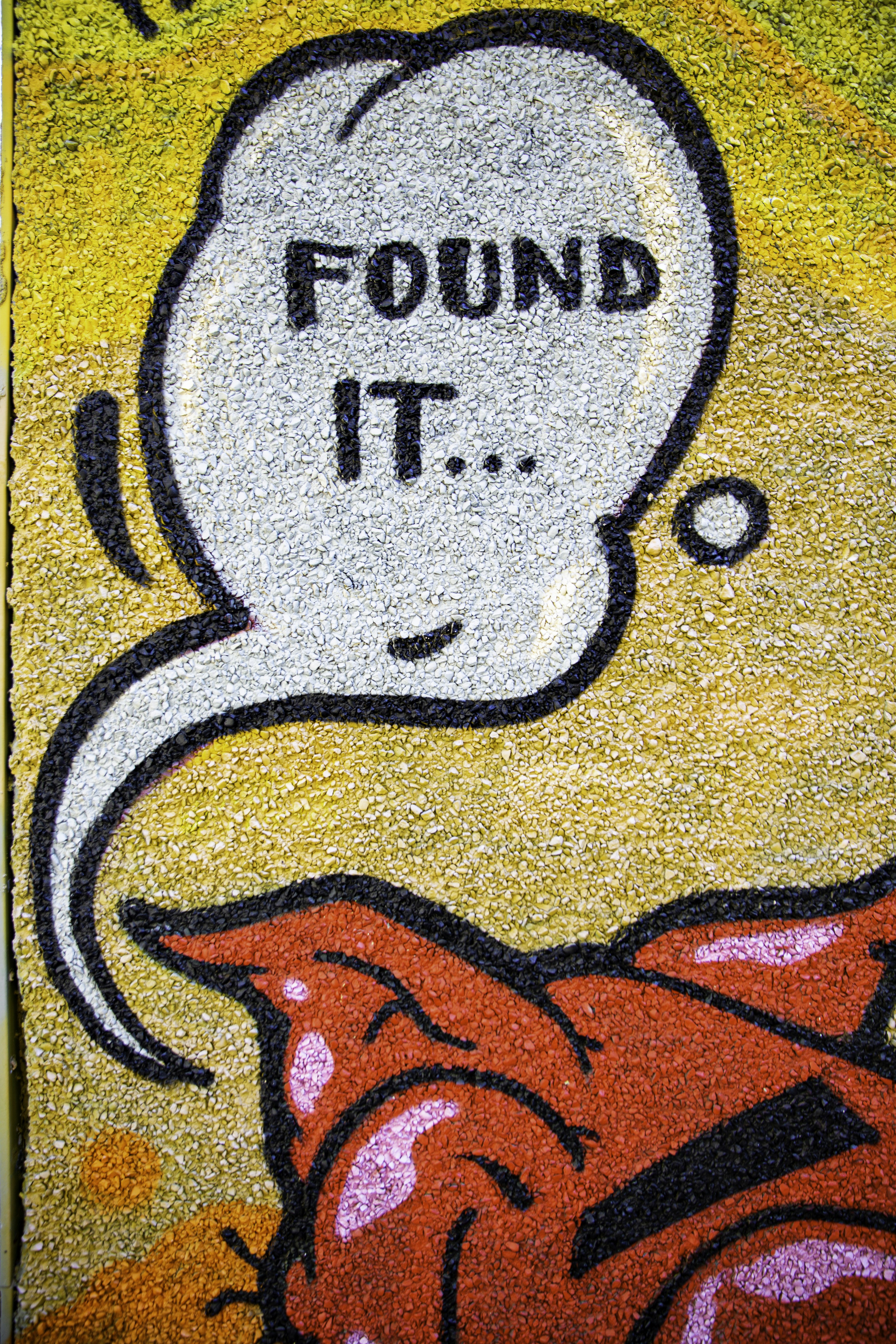 Found It: Graffiti Ghost of a Balloon on a Textured Wall