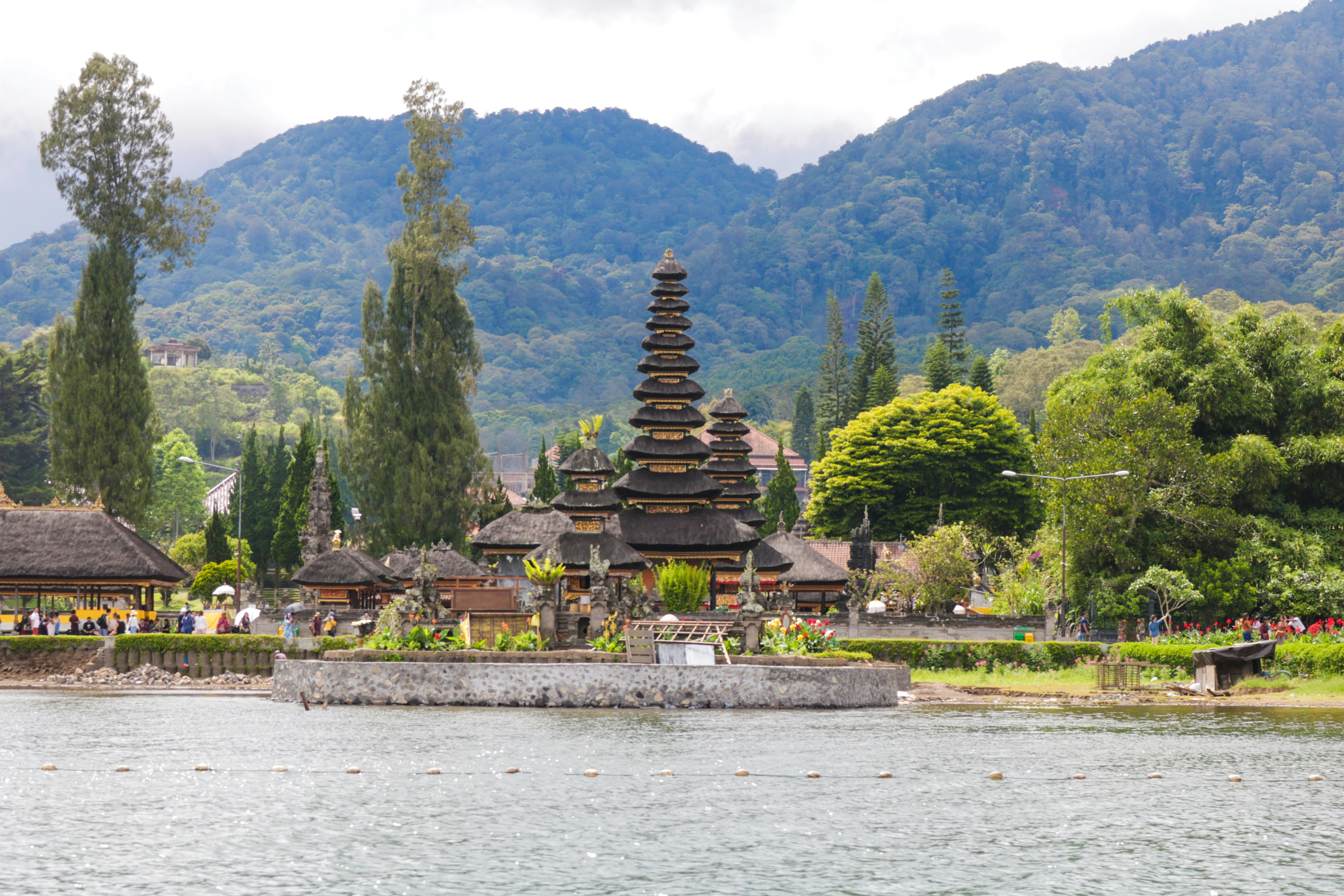 Temple Island on Tranquil Lake with Mountain Backdrop