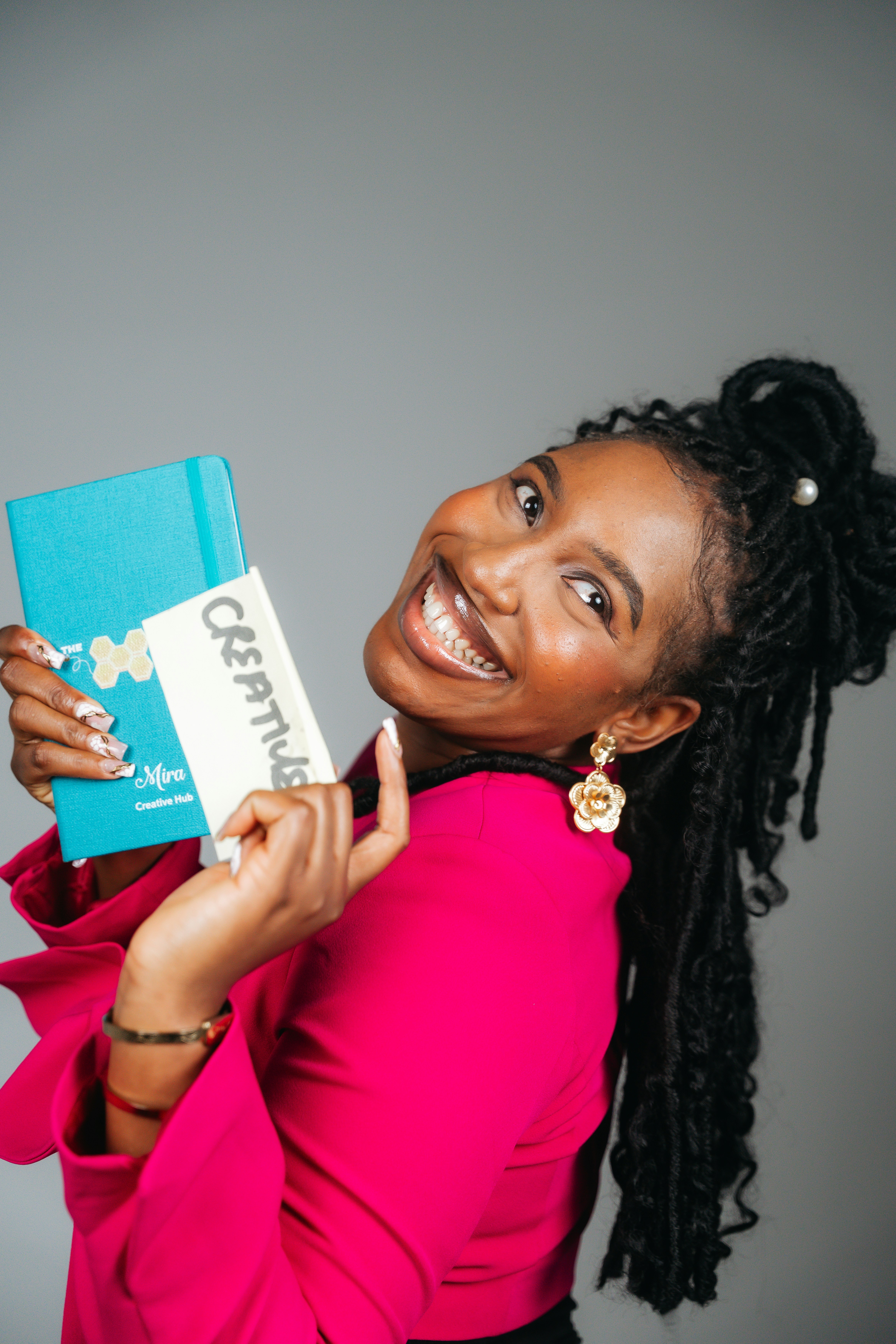Bright Smile, Bright Book: A Portrait of Joy with a turquoise journal