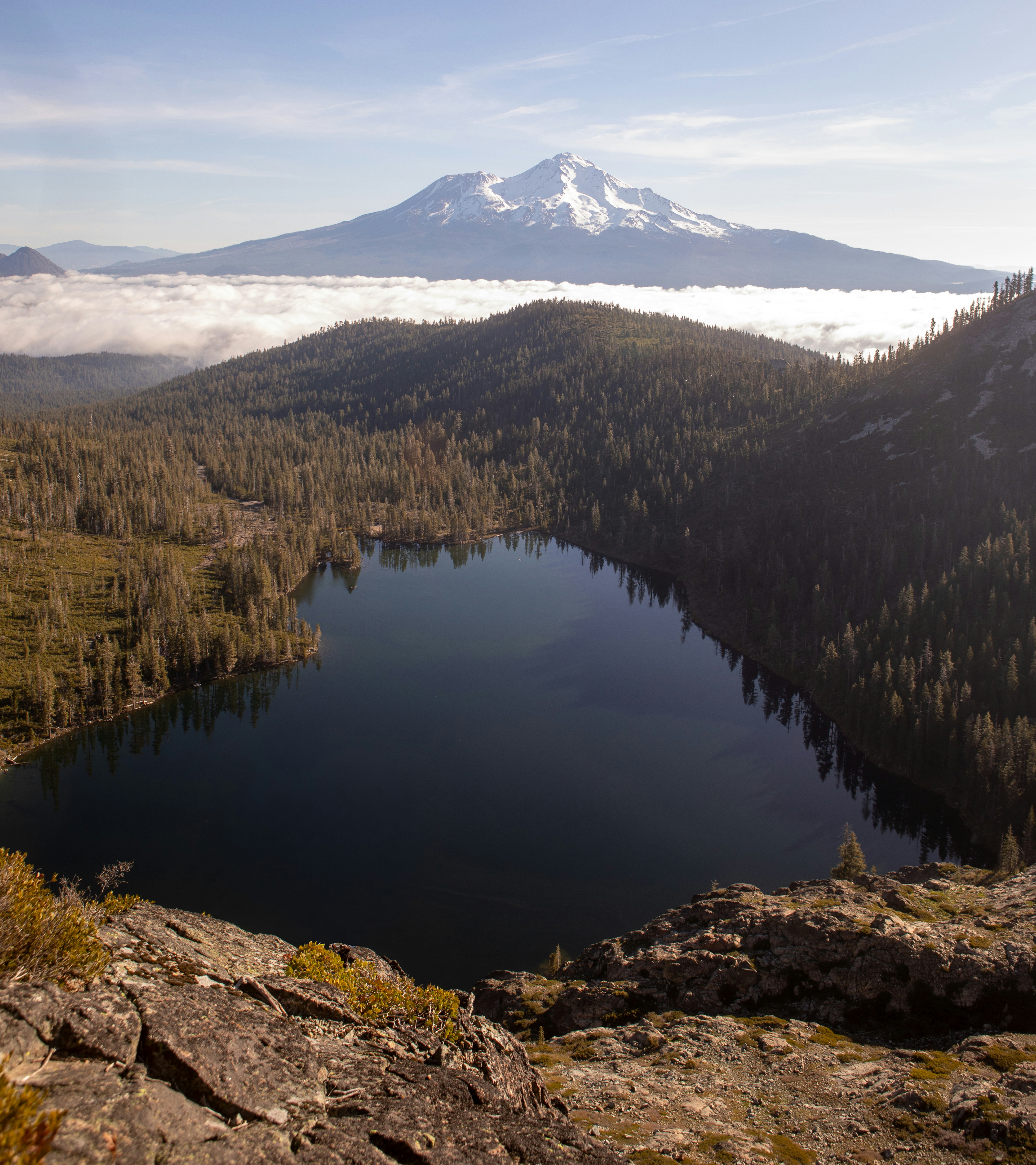 Cloud-kissed Cone: A Mountain Mirror Over a Quiet Lake