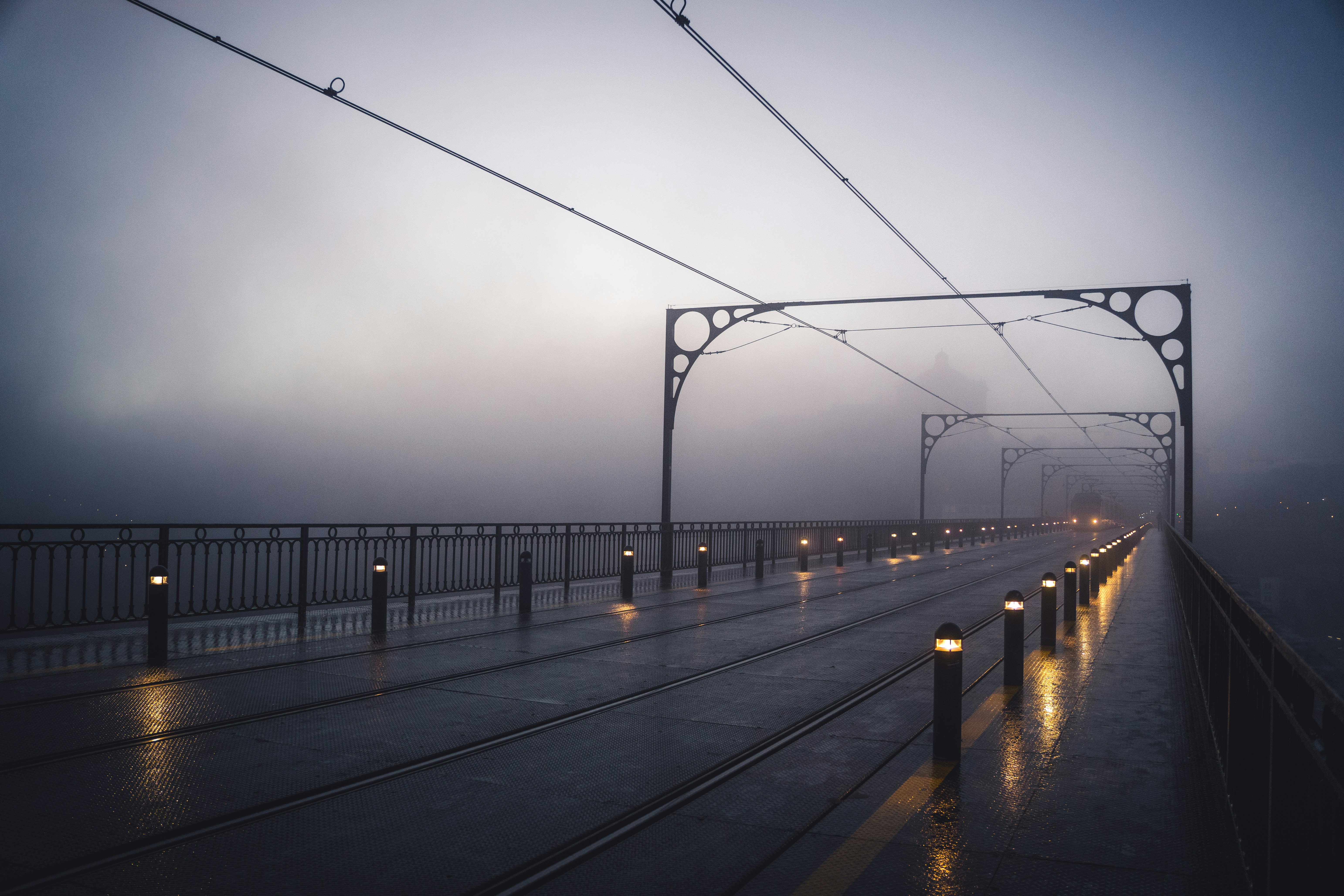 Fogbound Bridge: Rail Tracks into the Mist