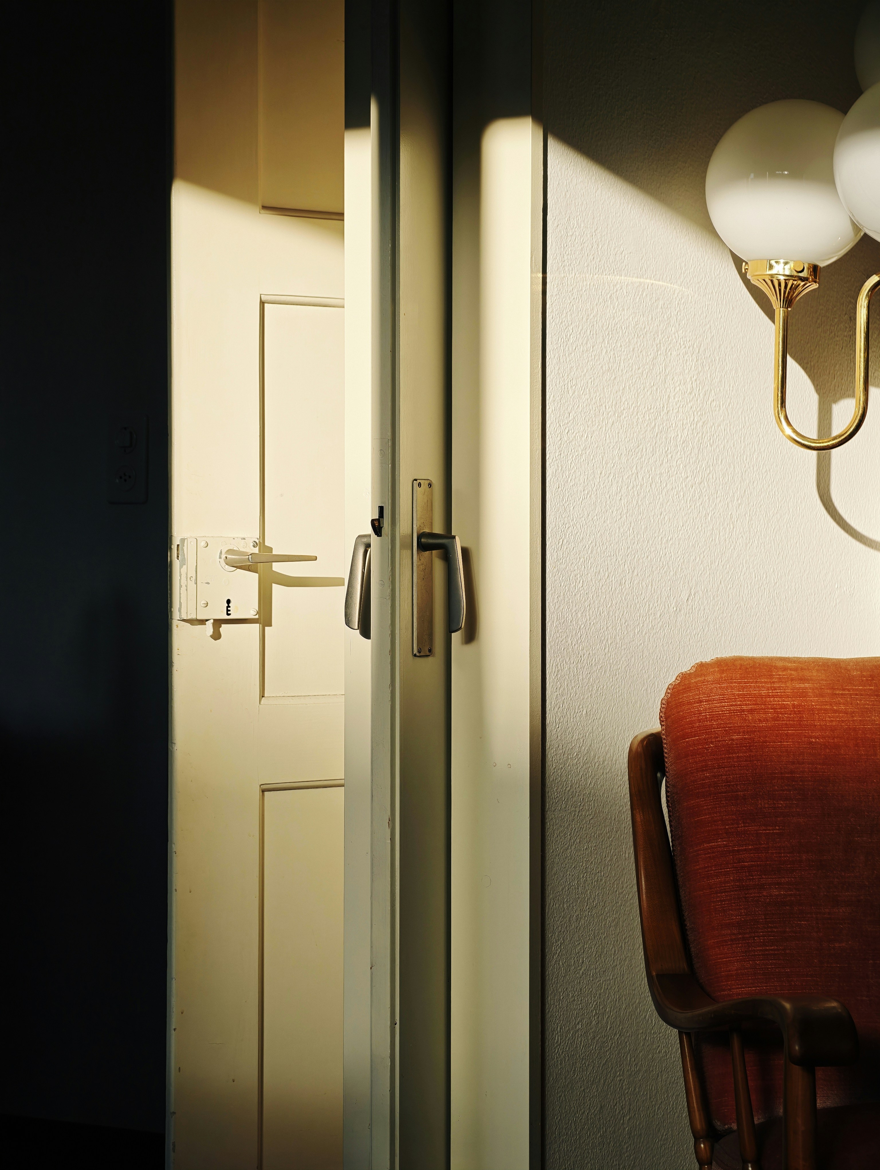 Doorway Shadow and Warm Corner: An Interior Portrait of Light