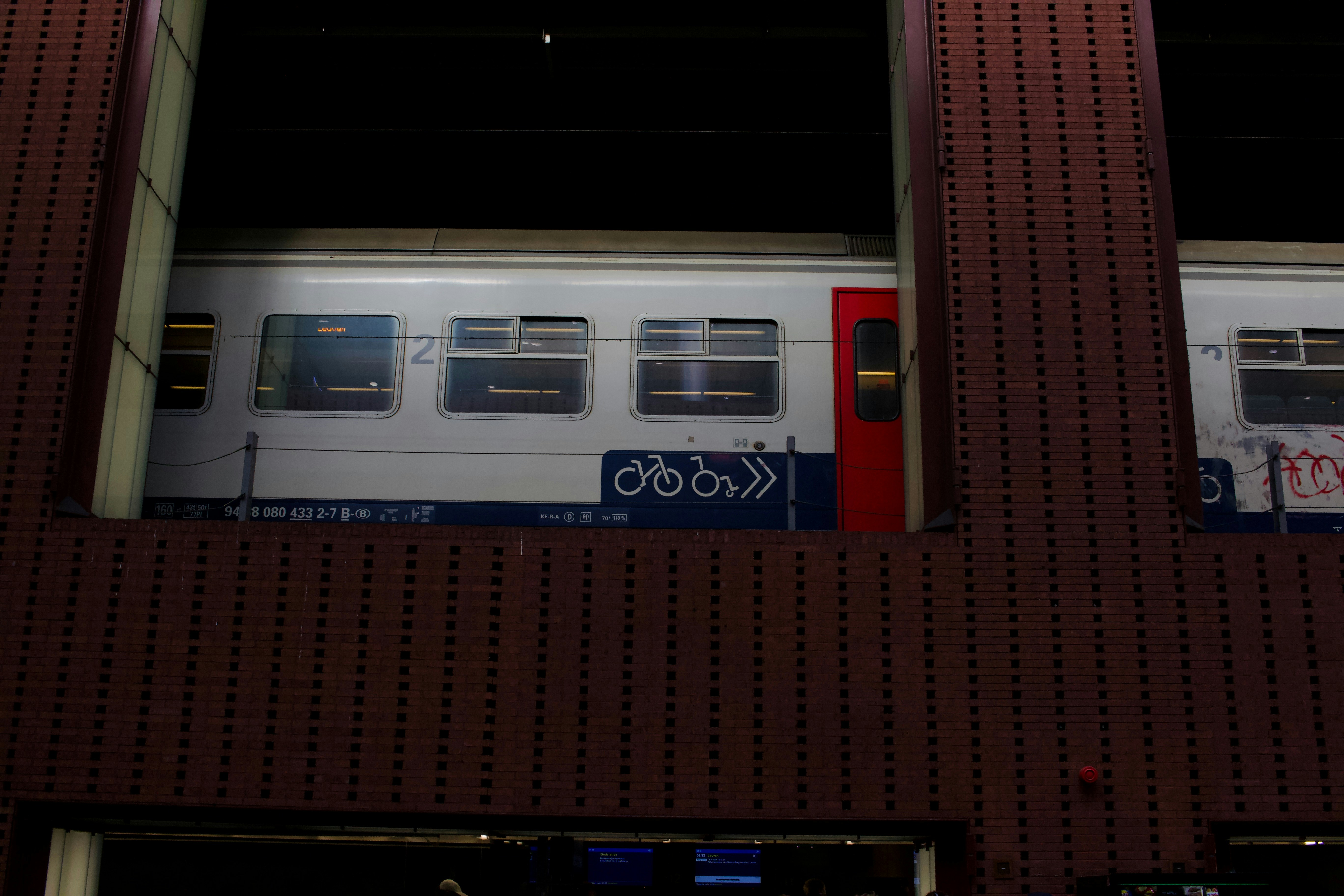 Chrome Subway Car Framed by Brick Arches