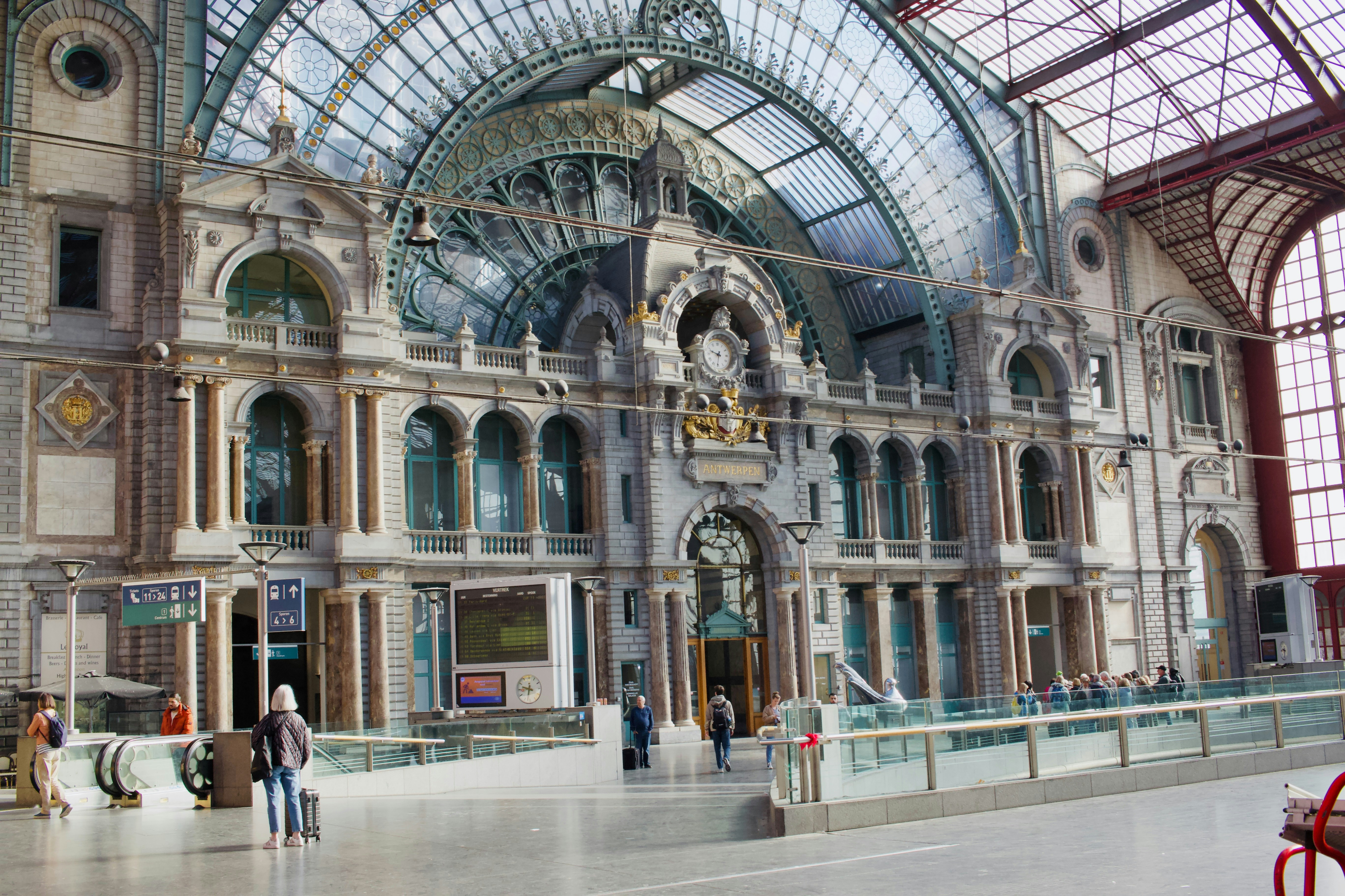 Ornate Train Station Facade under Glass Vault