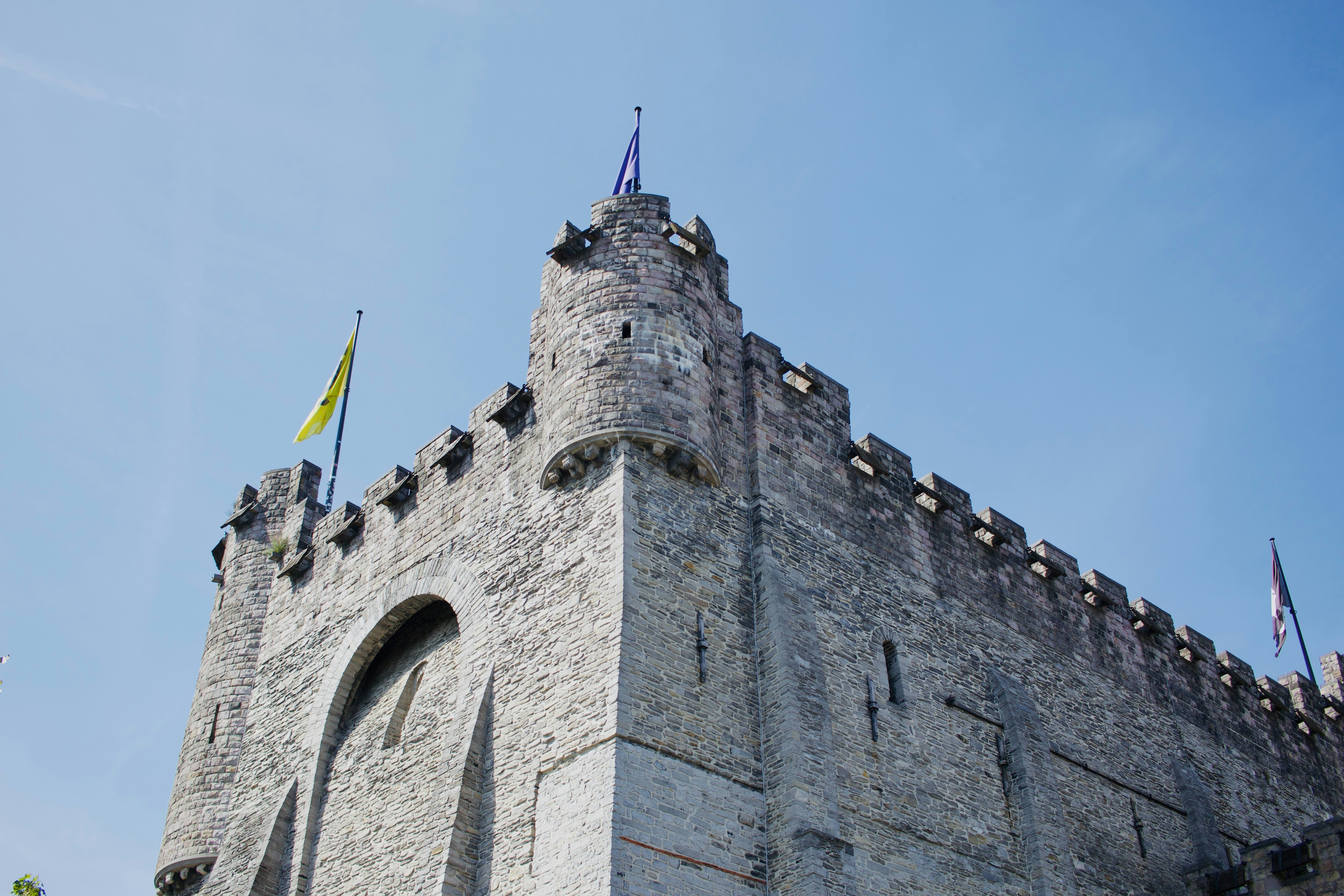 Castle Turret Reaching Toward a Clear Blue Sky