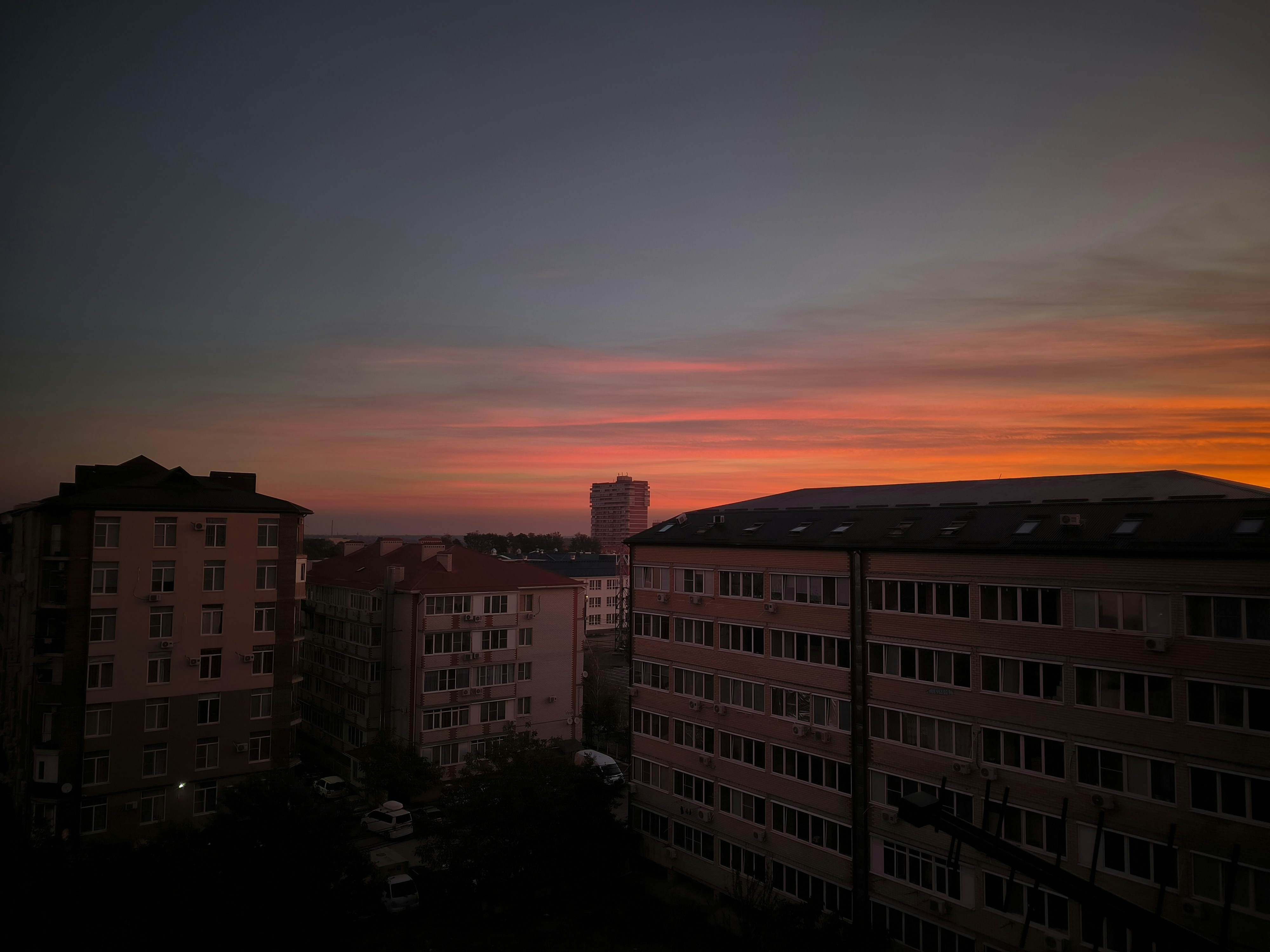 Twilight in the Courtyard: A Quiet Urban Sunset