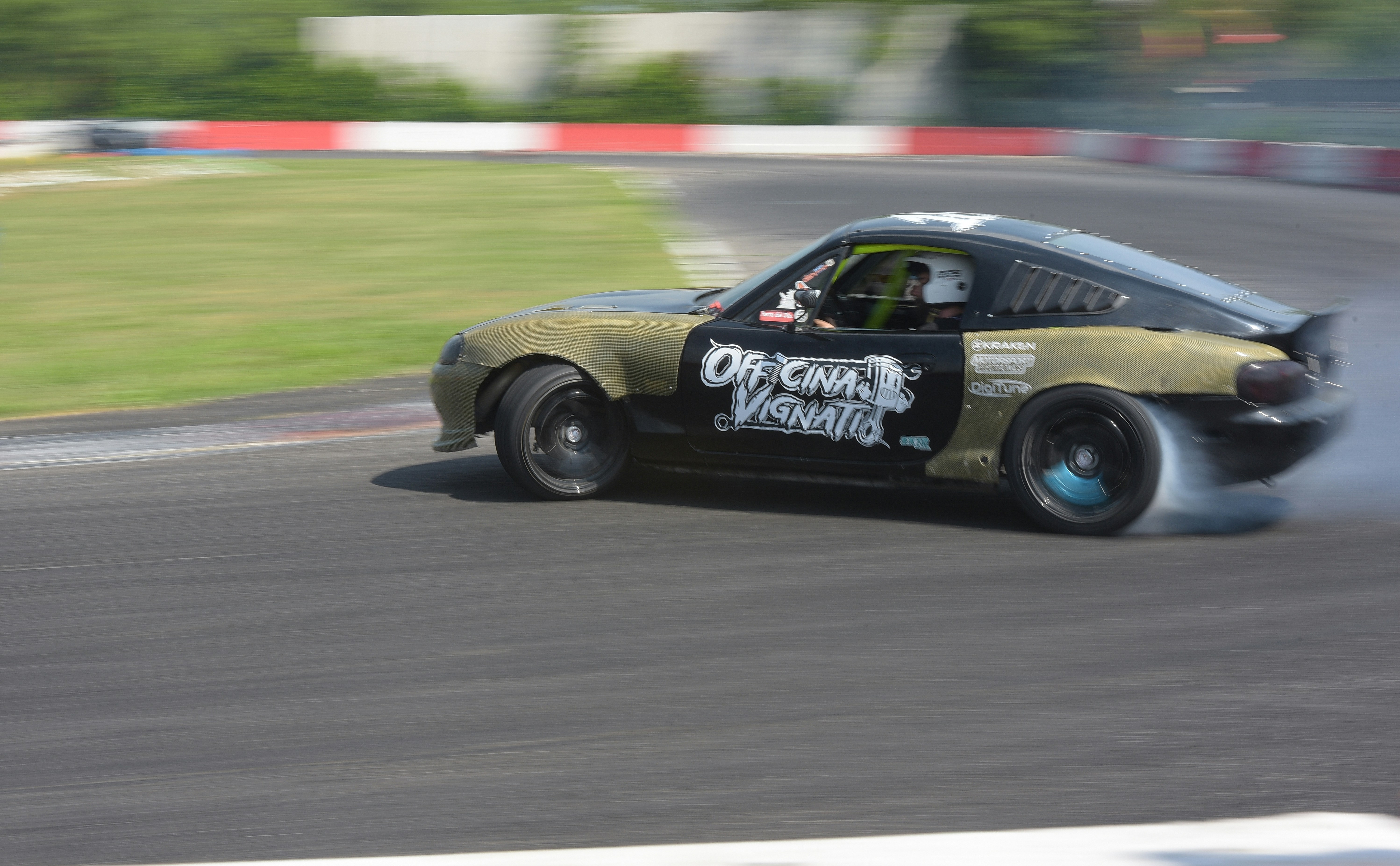 Vintage Livery in Motion: A Drifted Moment on the Raceway