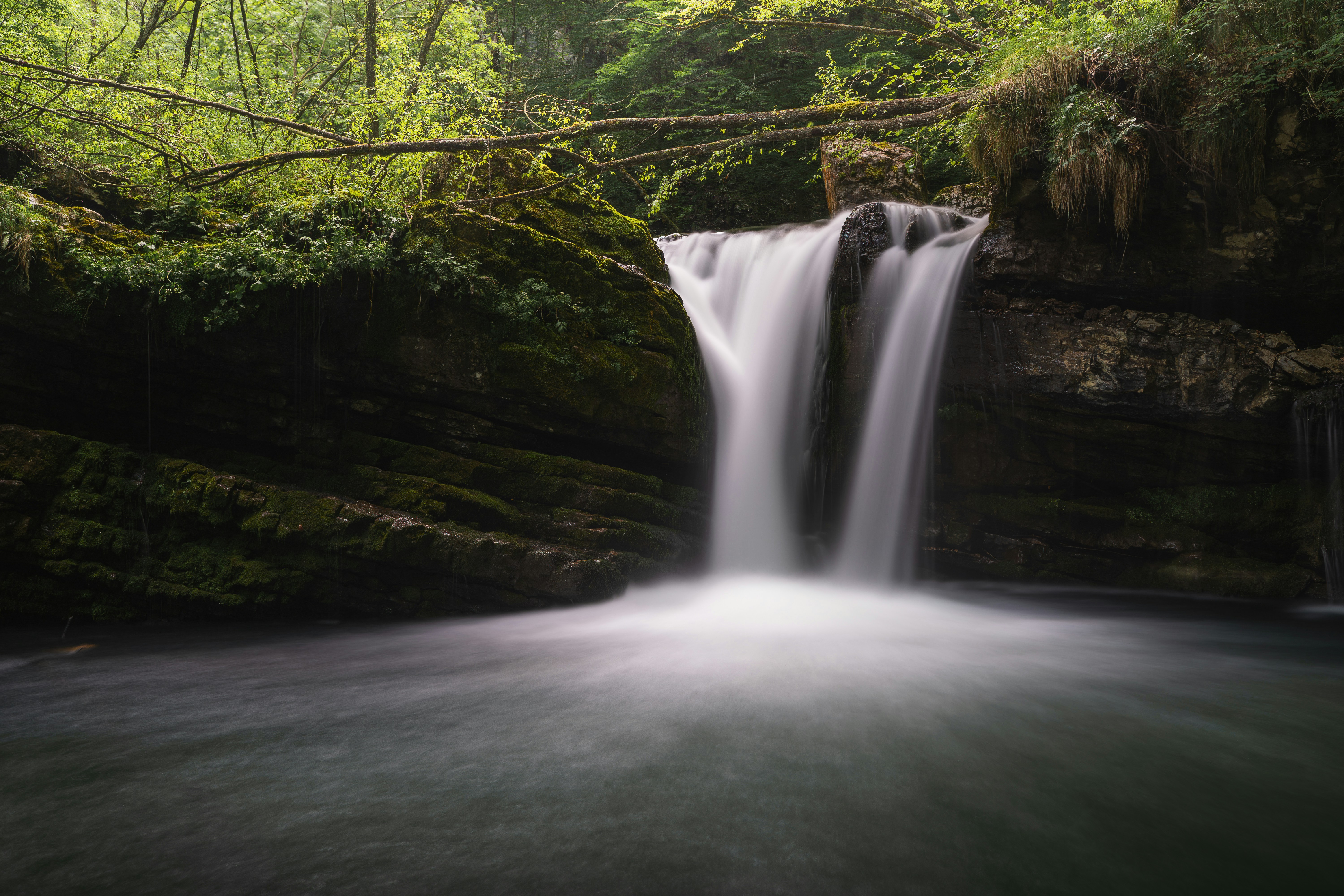 Silent Cascade: Moonlit Curtain over Mossy Stone