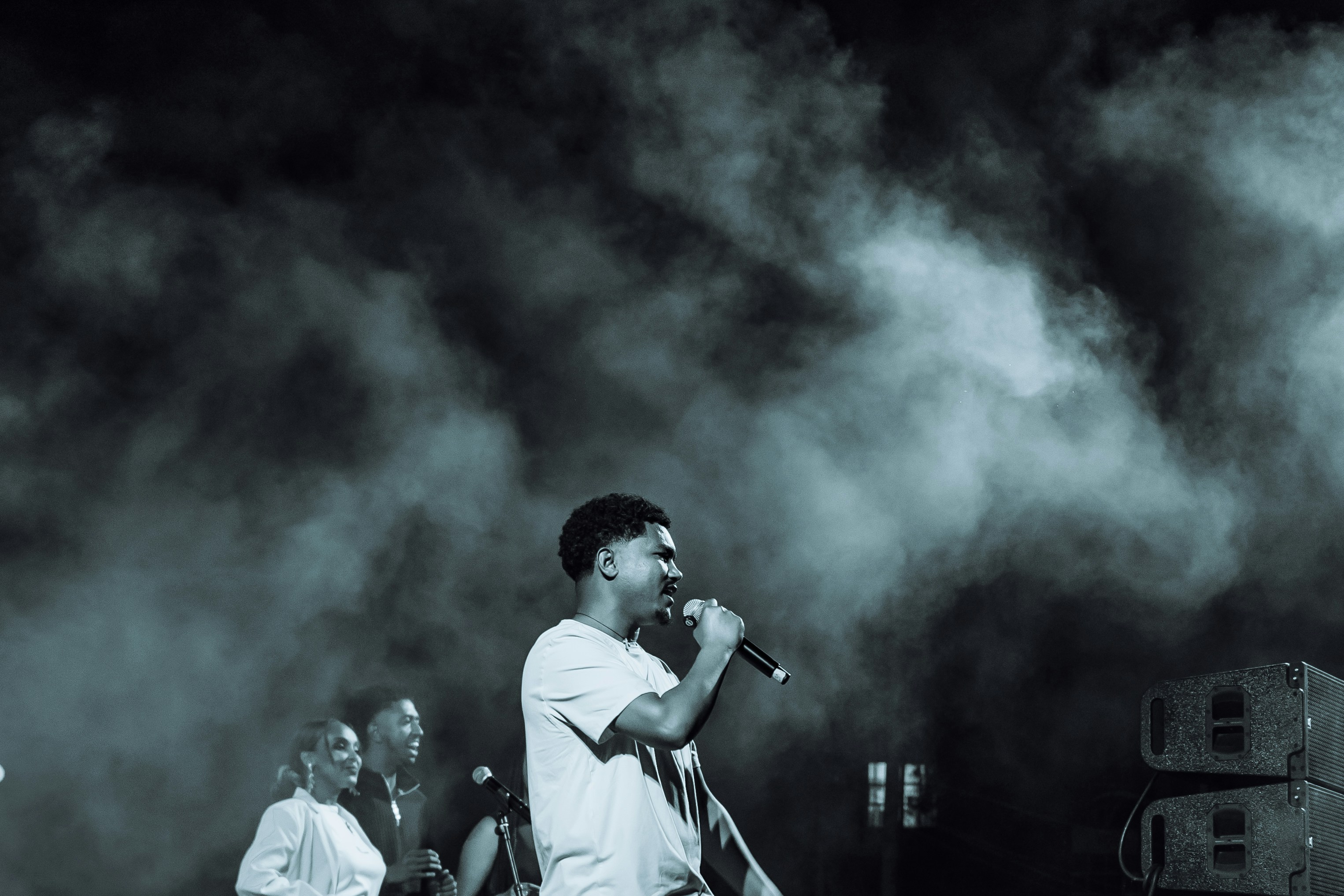 Mid-Song Moment: Vocalist in a Clouded Spotlight