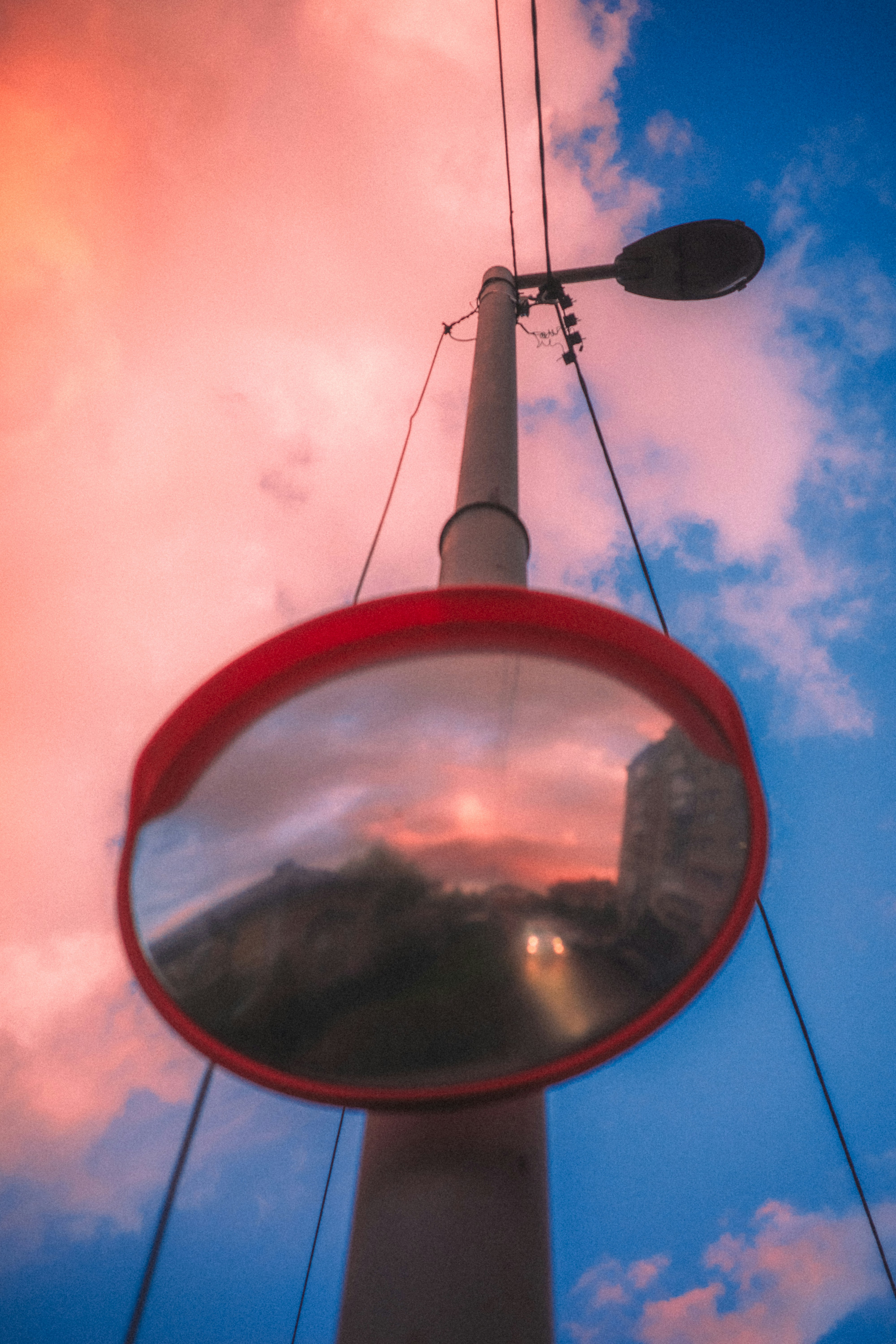 Mirror on a Pole: Sunset Reflections Align the Street Lamp