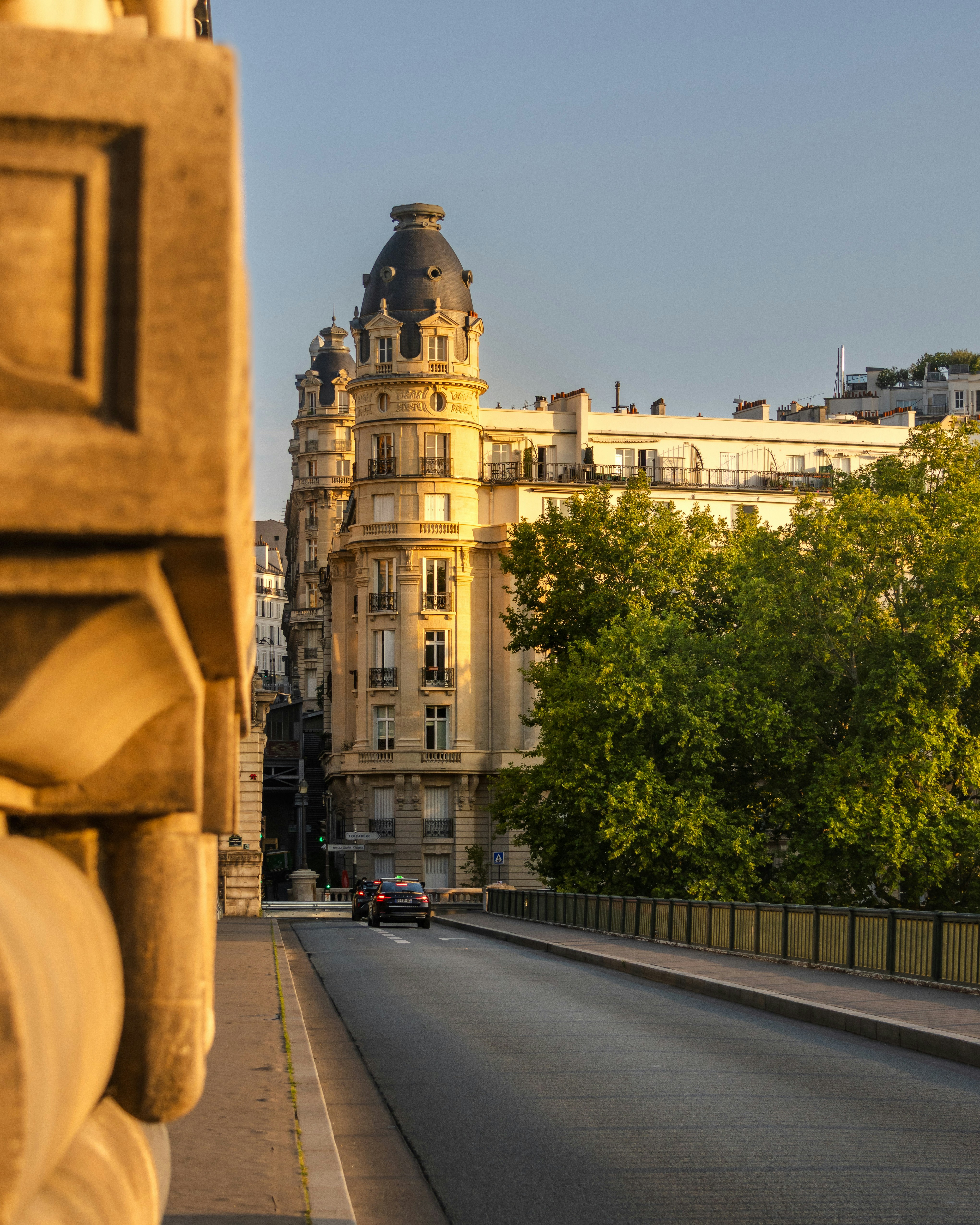 Gatehouse Shadows over a Parisian Arcaded Street