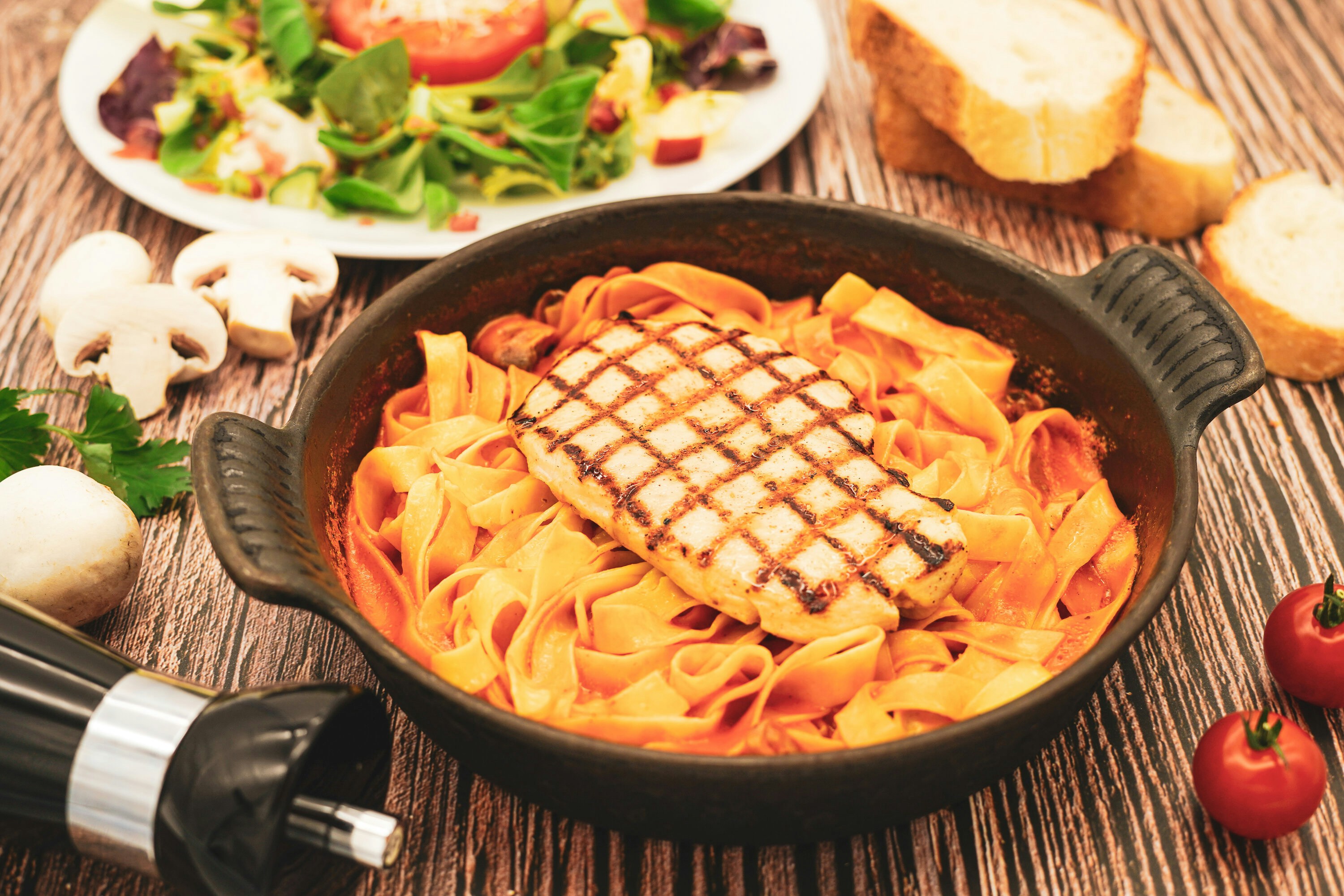 Pasta Pillow with Grilled Chicken in a Rustic skillet