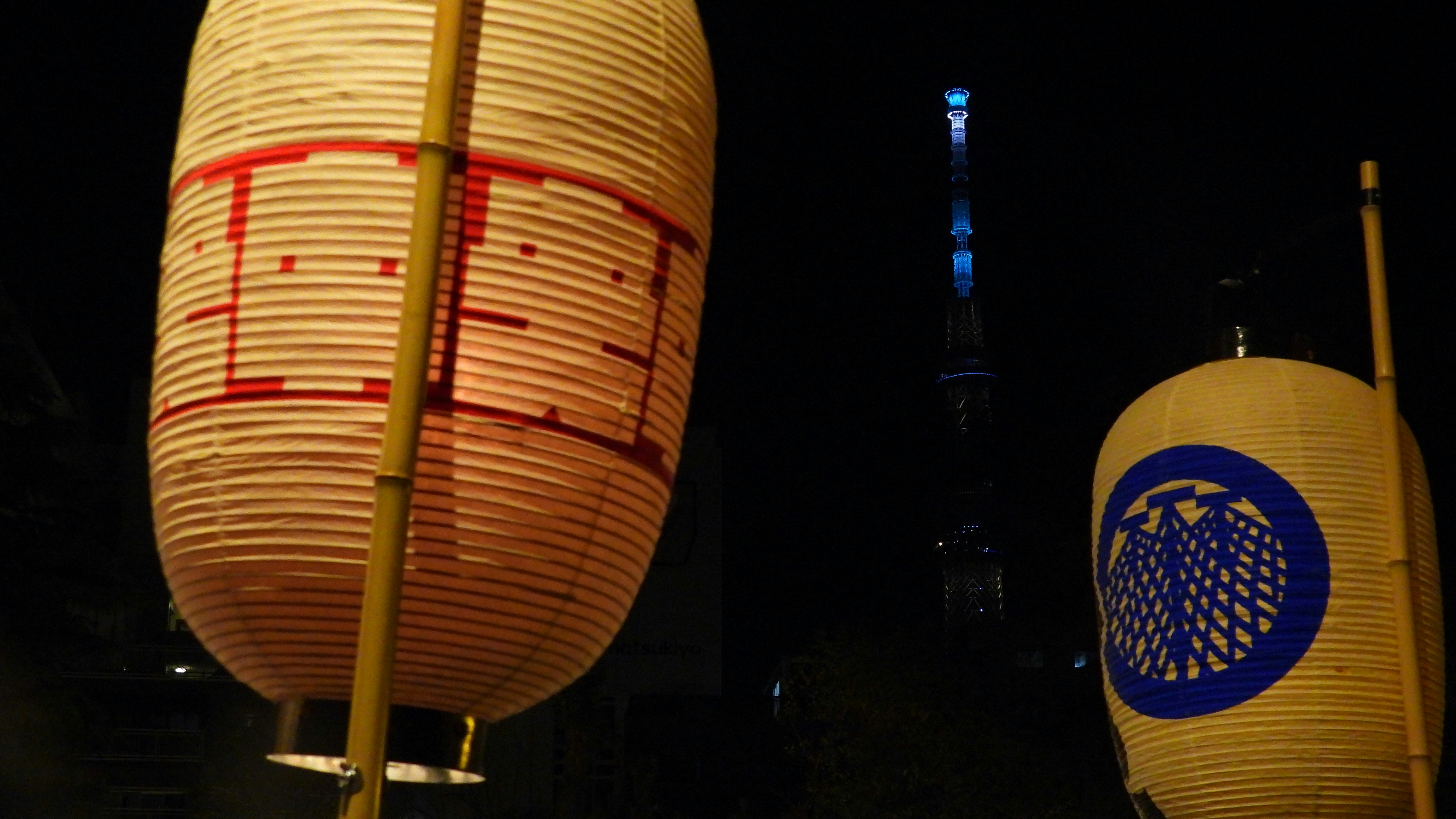 Lanterns at Midnight: A Quiet Night by the Neon Spire