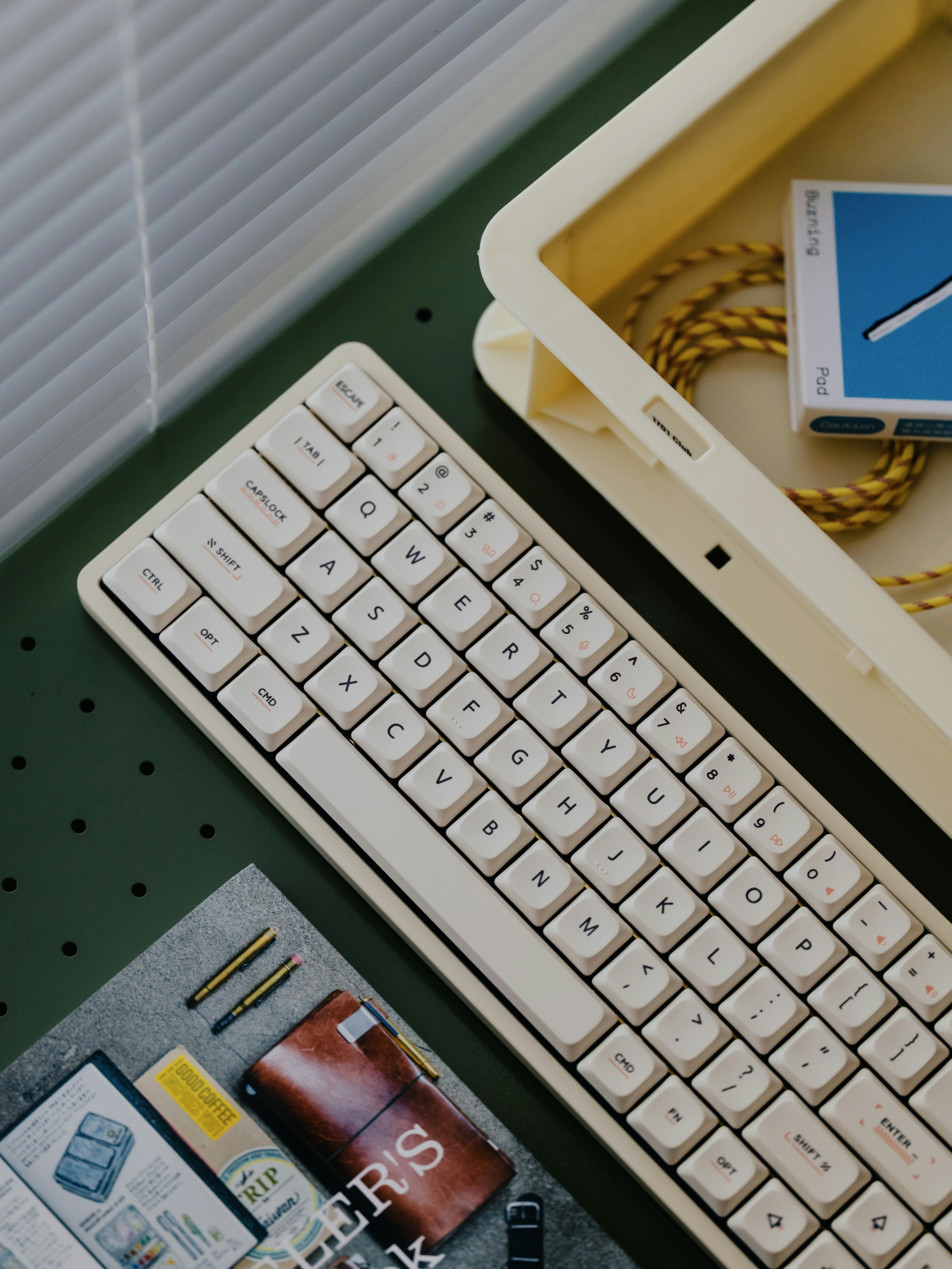 Retro Keyboard and Tech Essentials on a Mint Desk