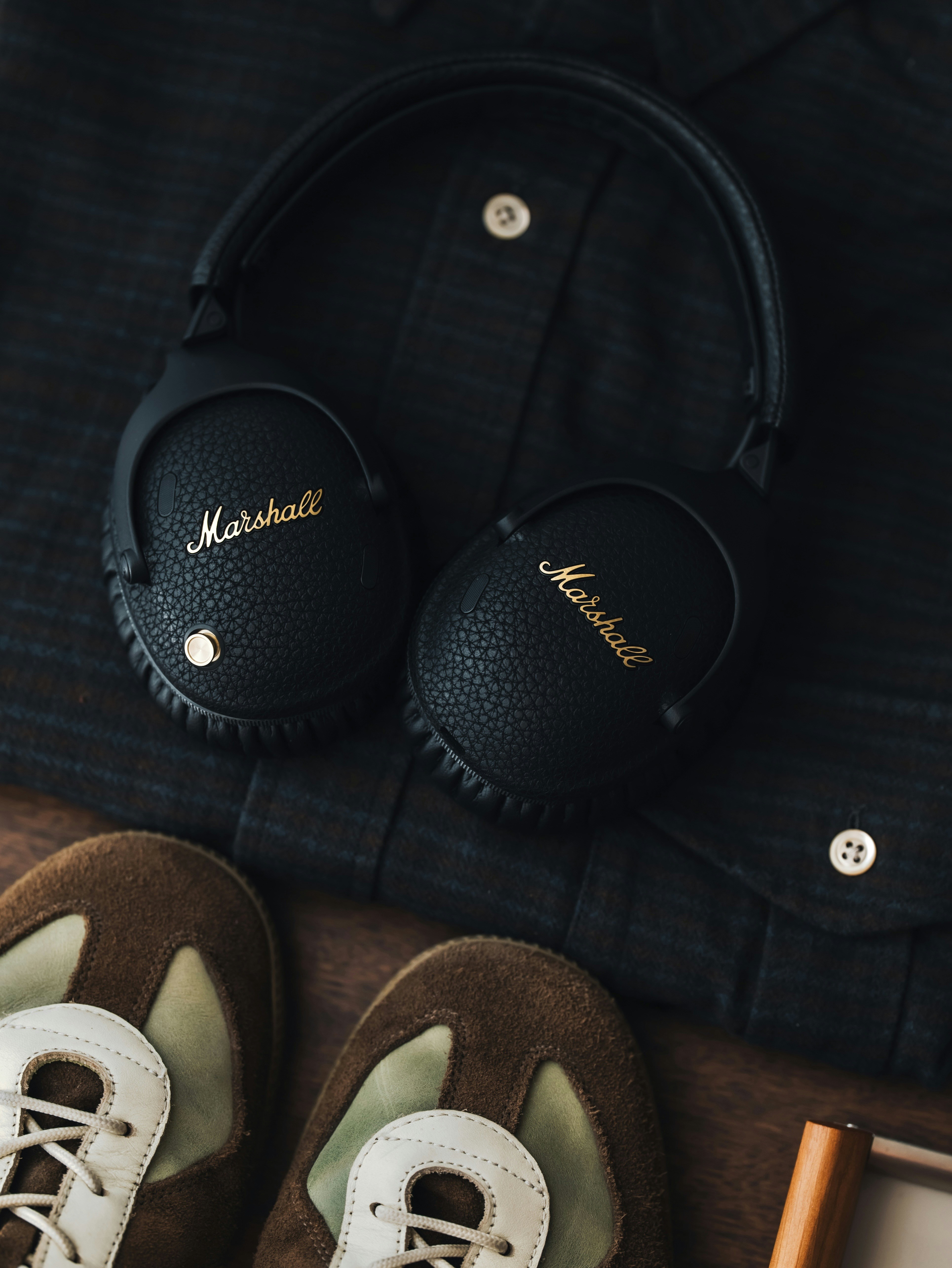 Marshall Black Gold: A Close-Up of Classic Studio Headphones on a Planted Desk