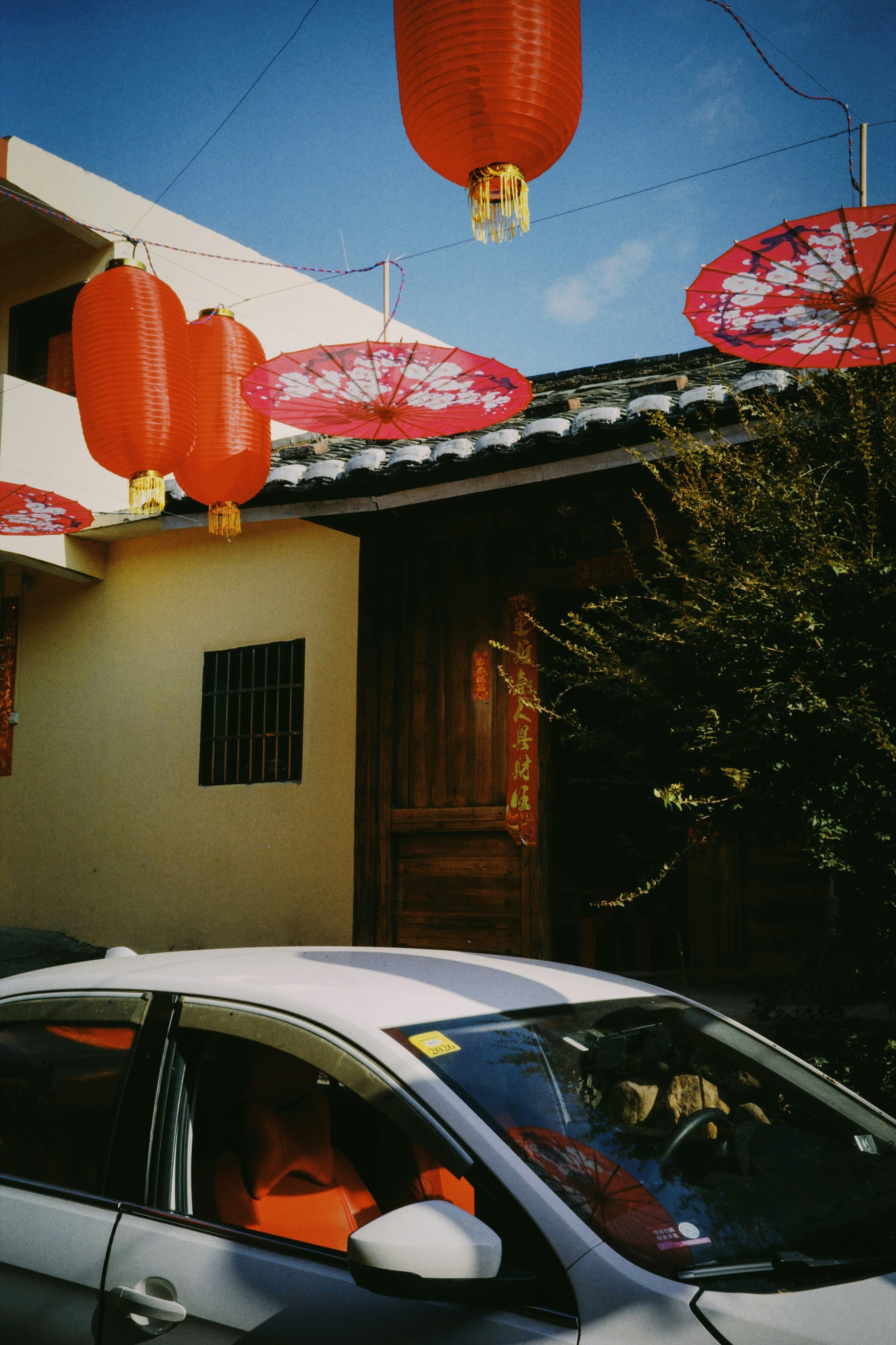 Lanterns in Bloom over a Quiet Courtyard Ford