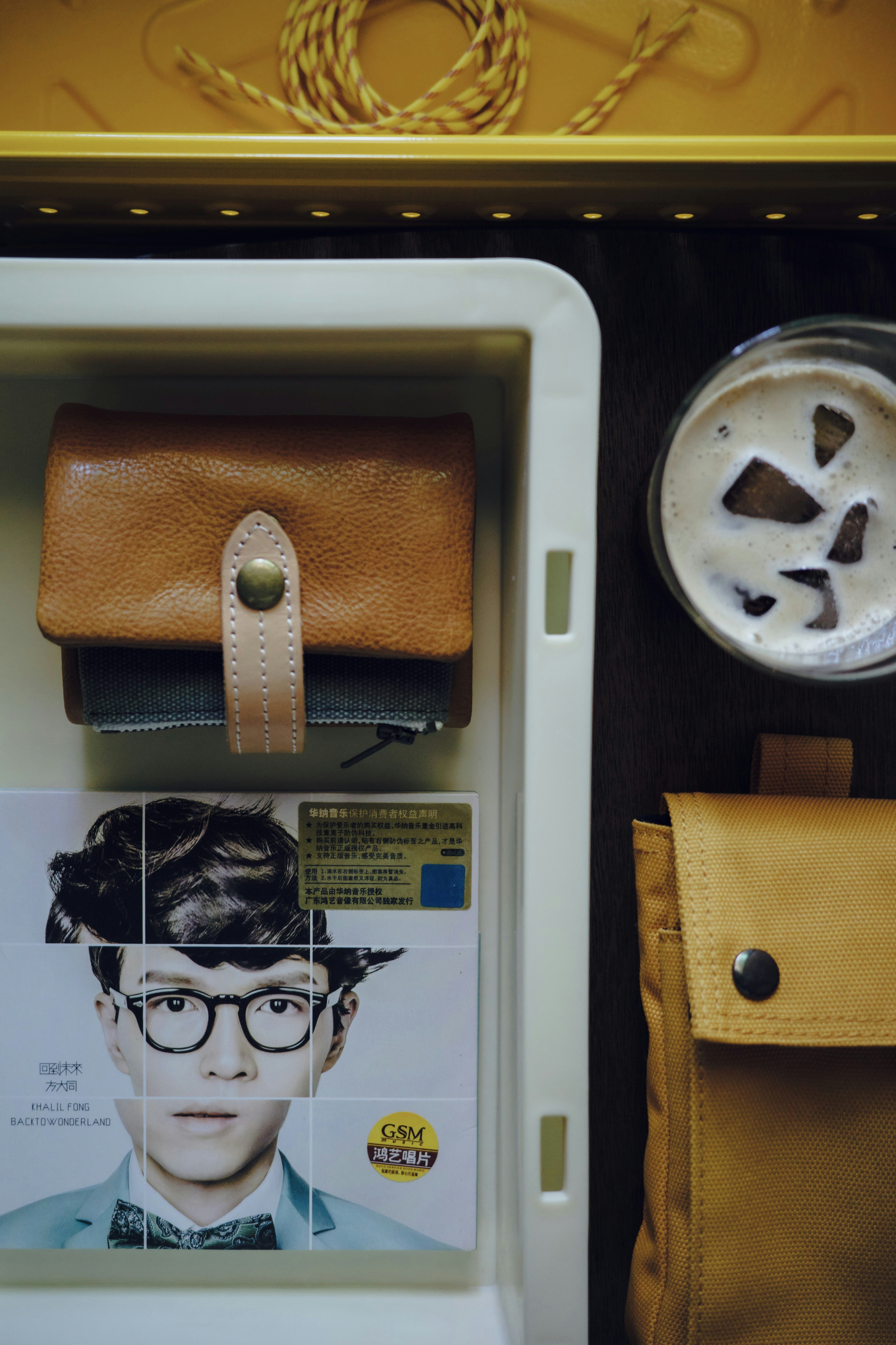 Wallets, Cups, and a Portrait Closer Look