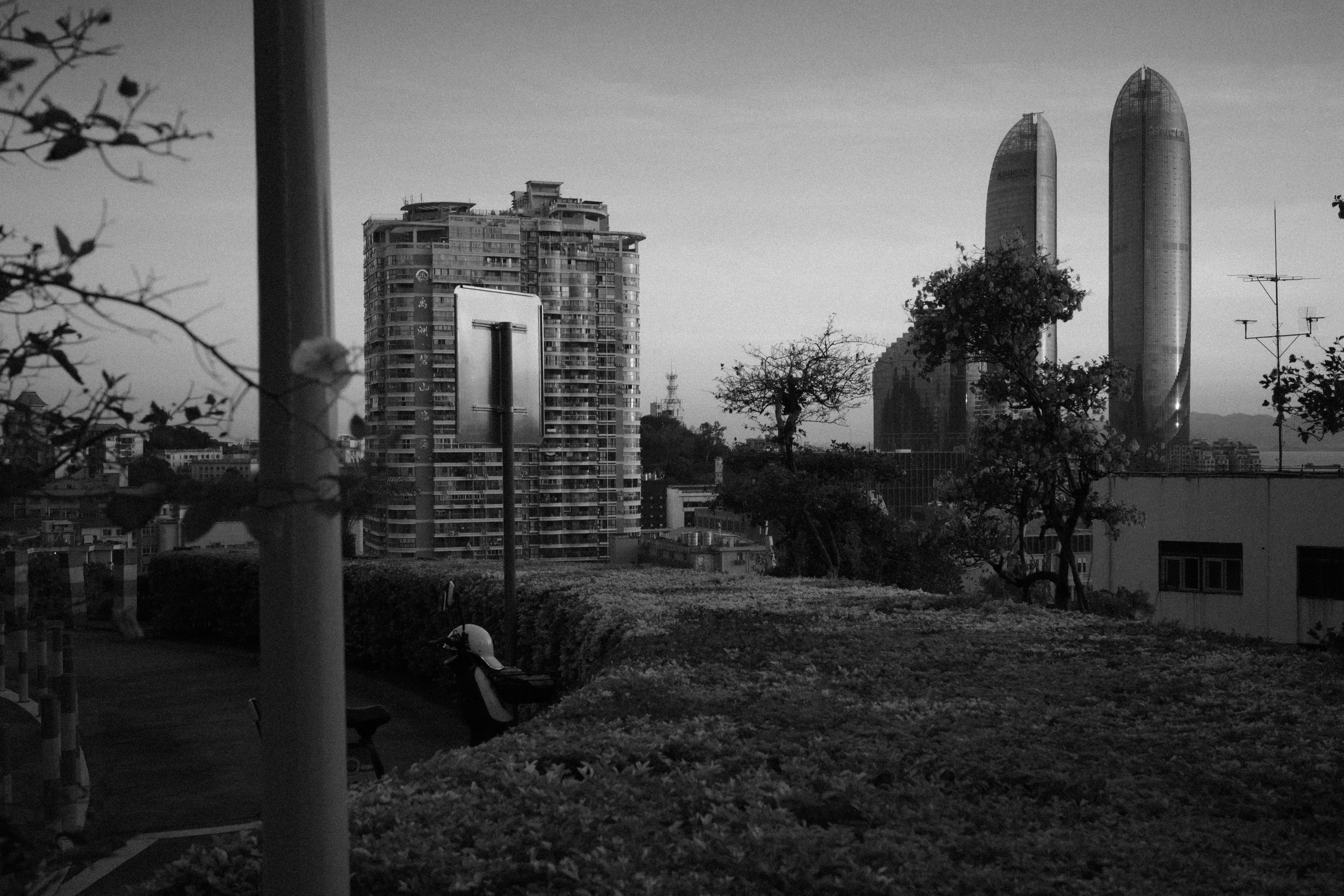 Urban silhouettes under a tethered skyline