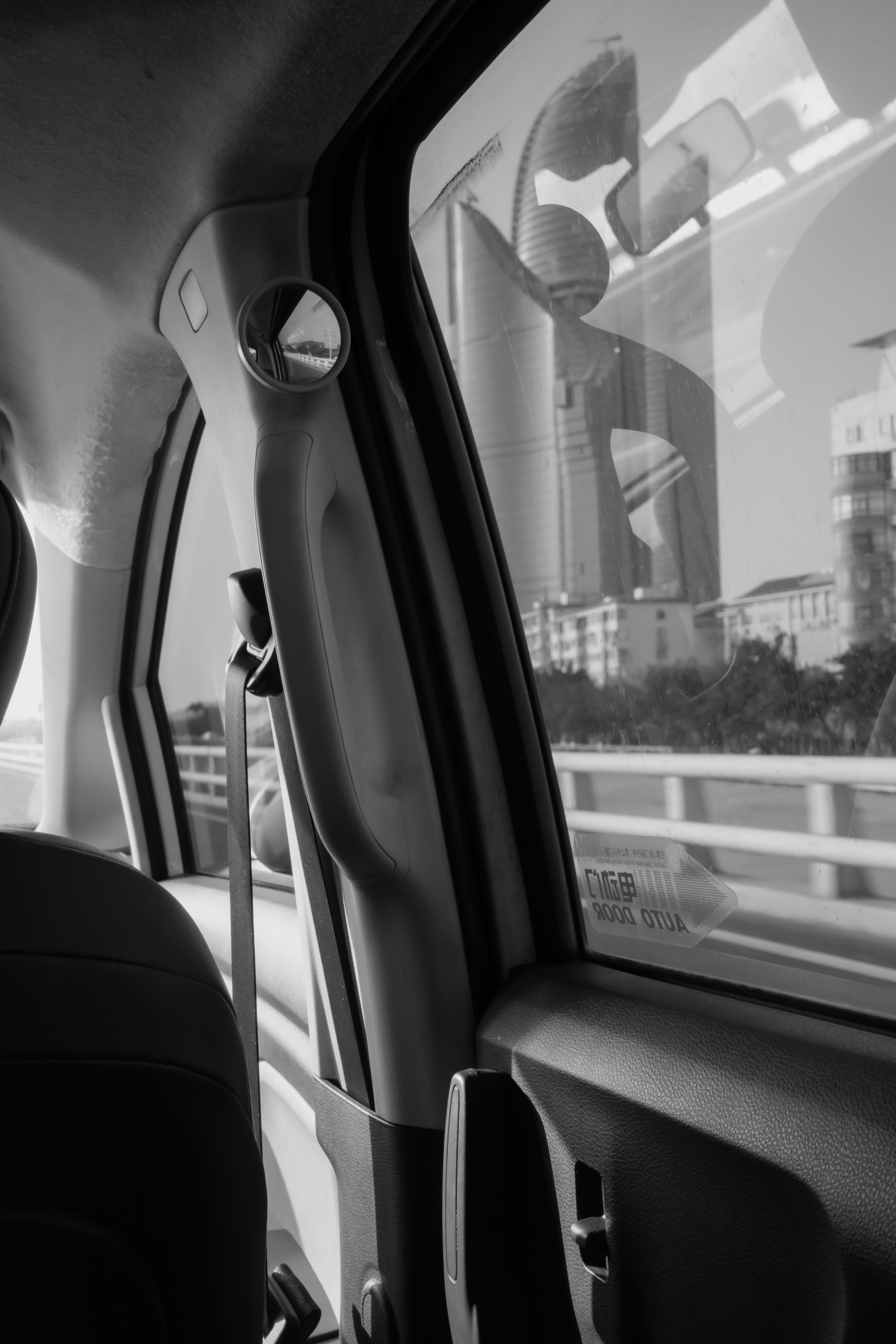 Windowseat Reflections: Urban Geometry through a Car Window