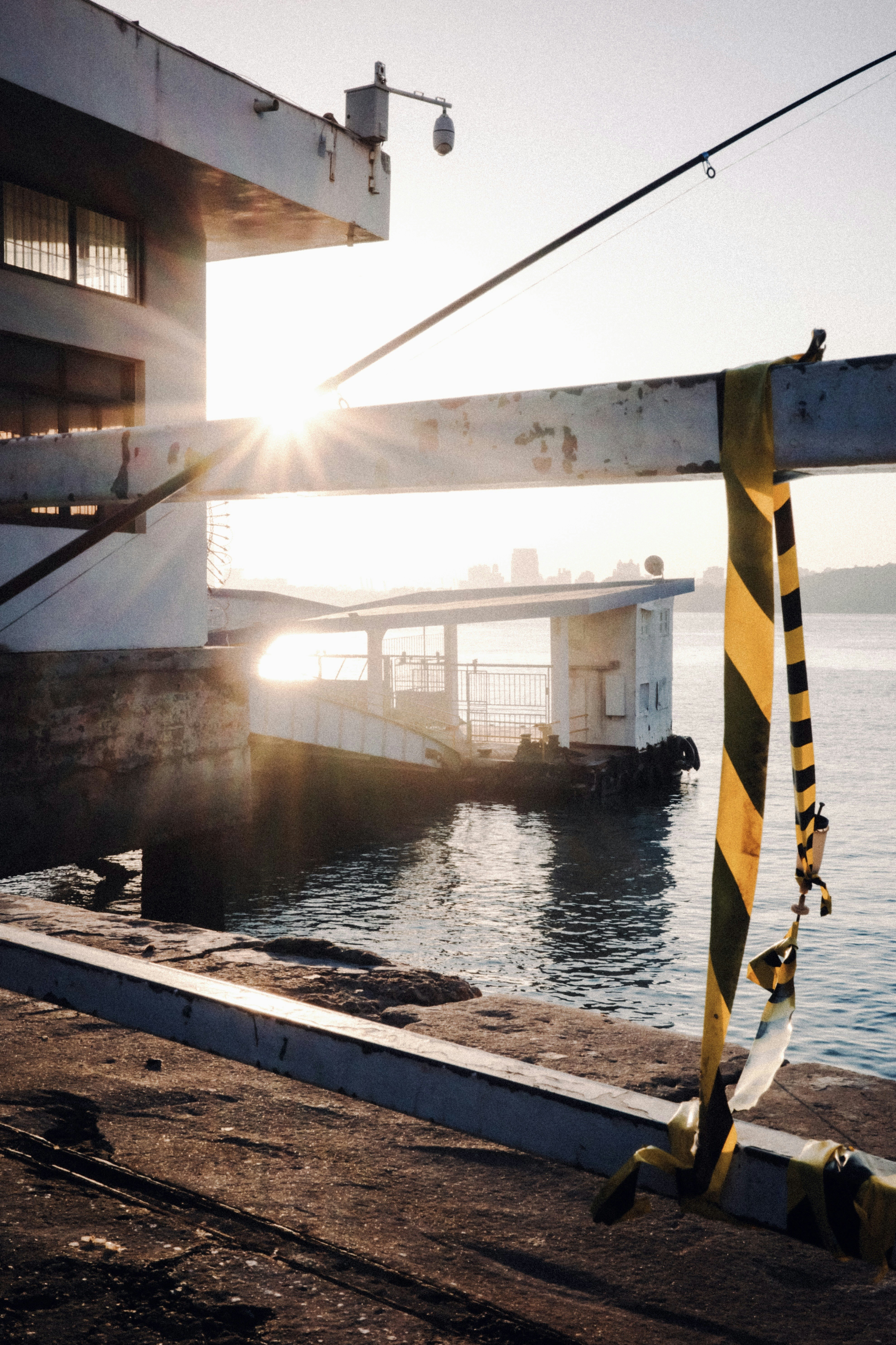 Sunburst at the Pier: A Quiet Moment by the Waterfront