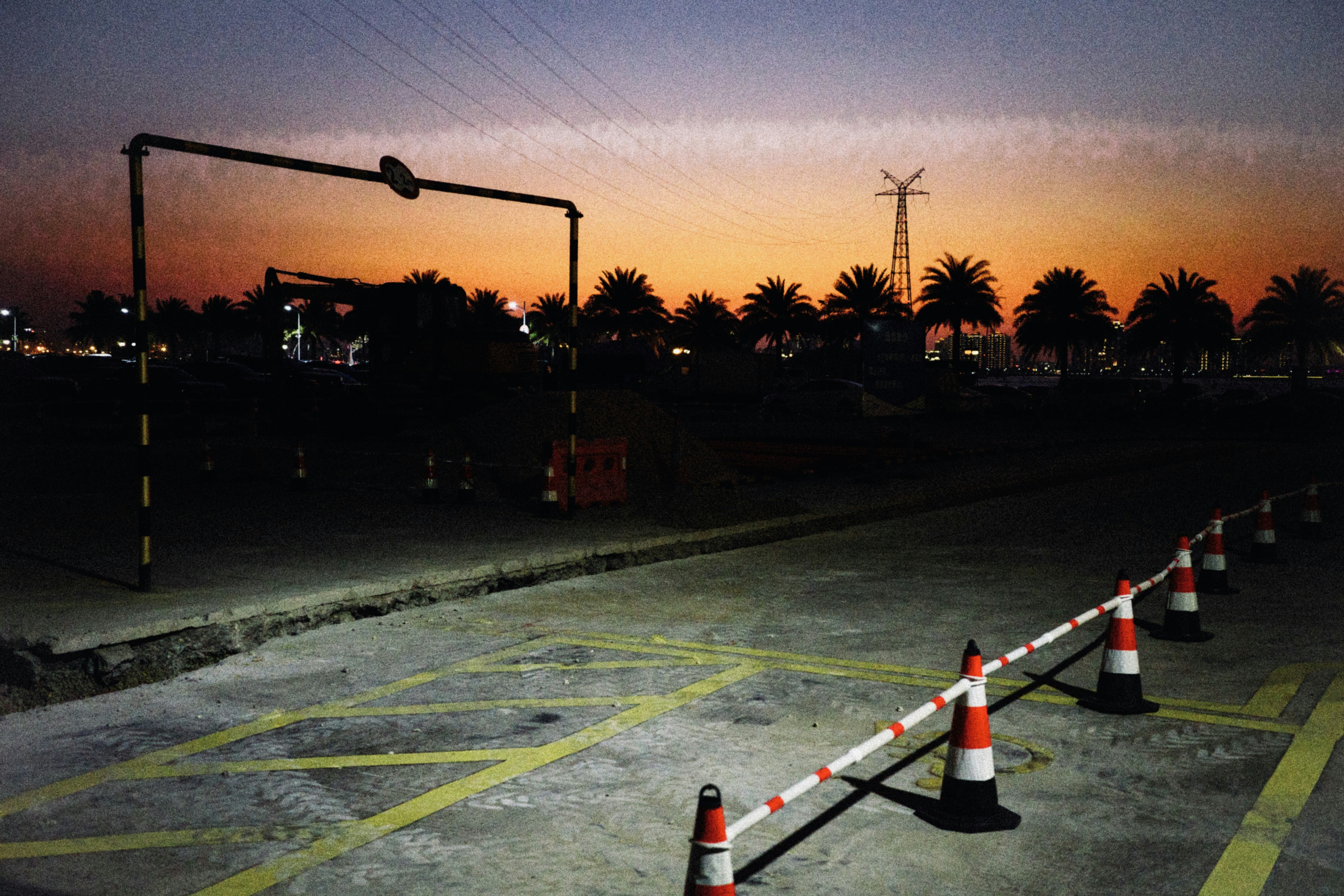 Sunset Silence over a Street of Cones