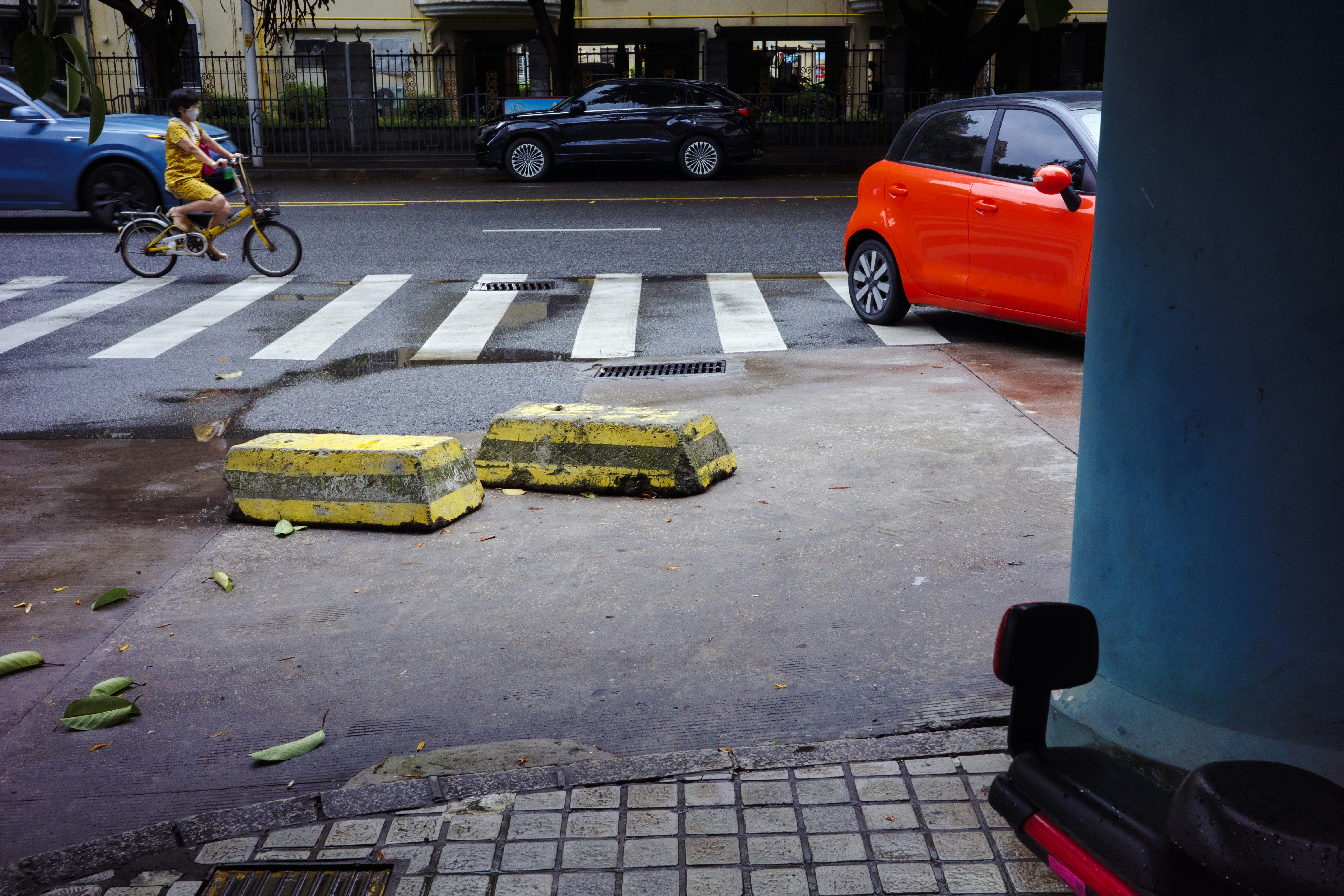 Crosswalk Quiet: A Street Corner Between Bicycle and Car