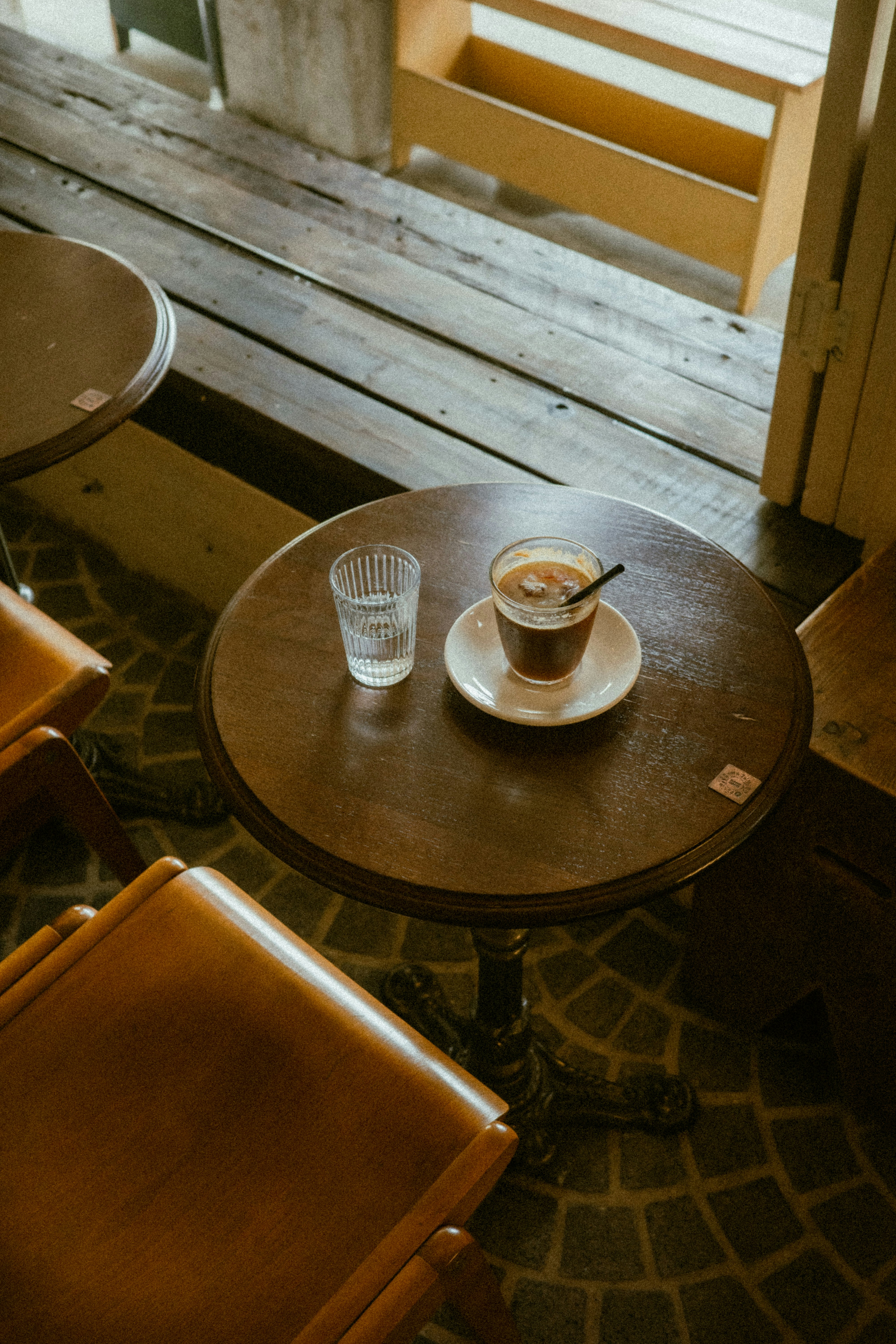 Quiet Coffee Table at Dusk: A Round Table Portrait in Warm Tones