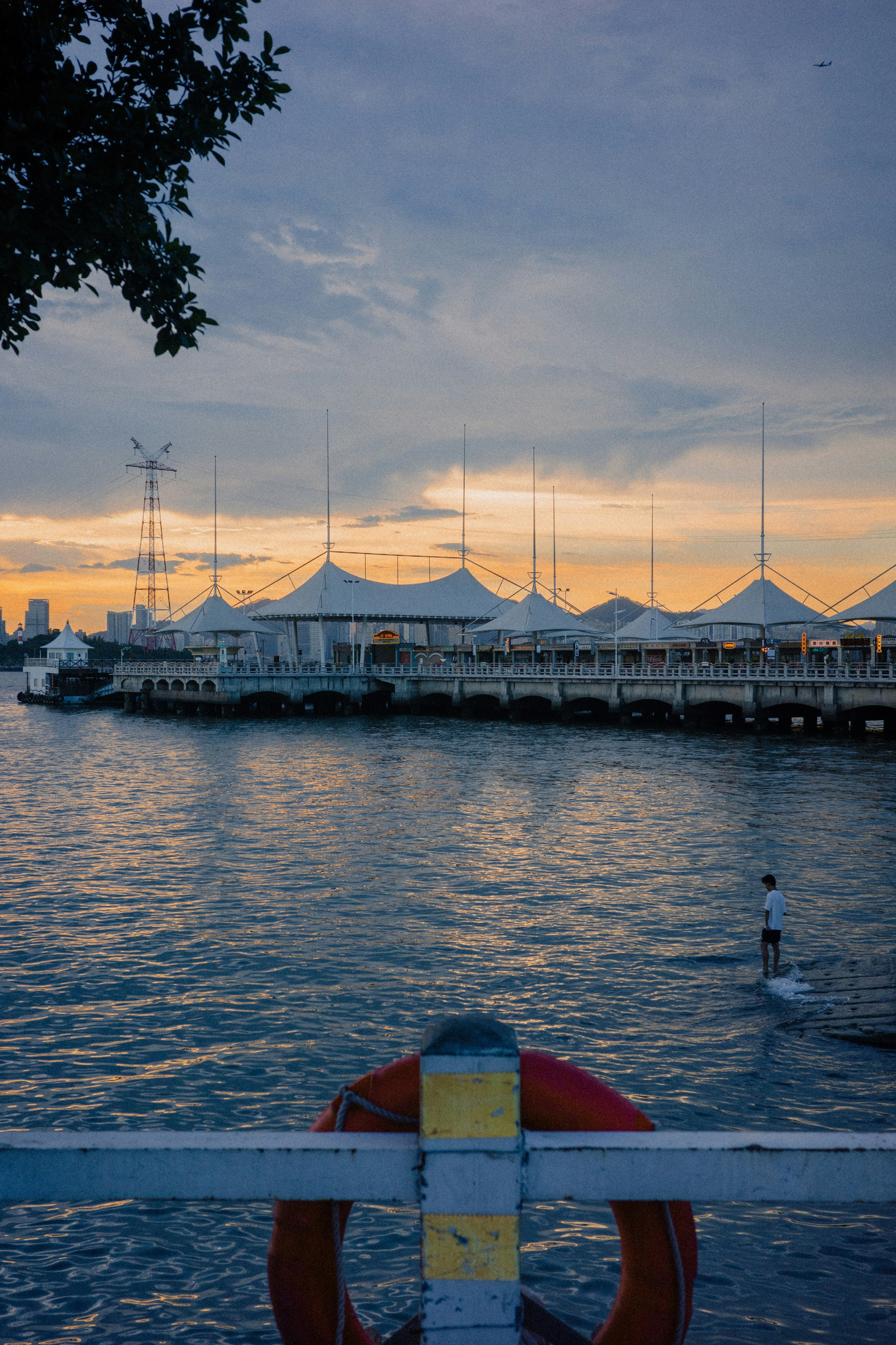 Harbor Silhouette at Dusk: Life by the Waterfront
