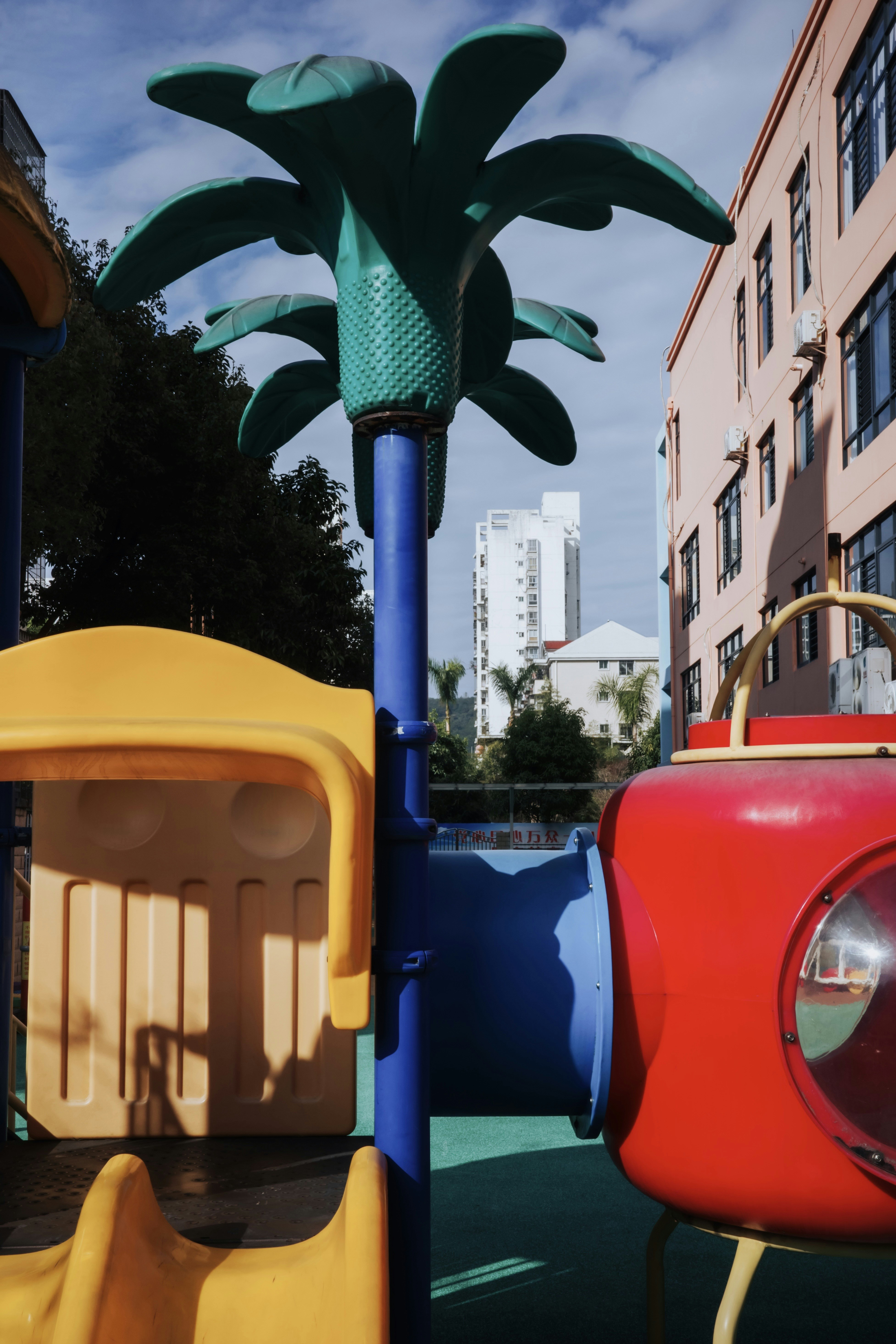 Playground Palm: A Colorful Urban Jungle Under a Crescent Sky