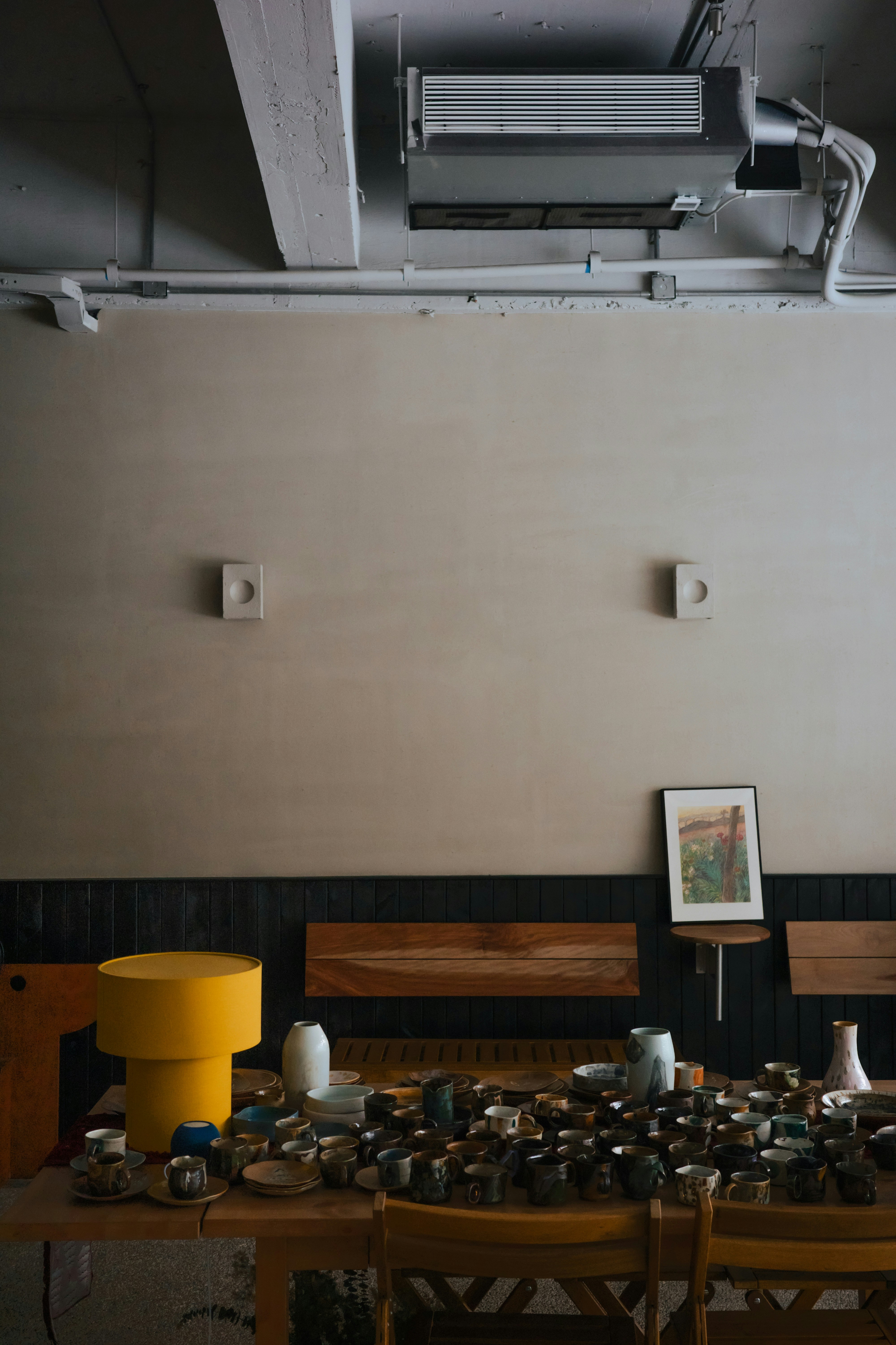 Dormant Gallery Table: A Quiet Spread of Ceramics in a Studio Space