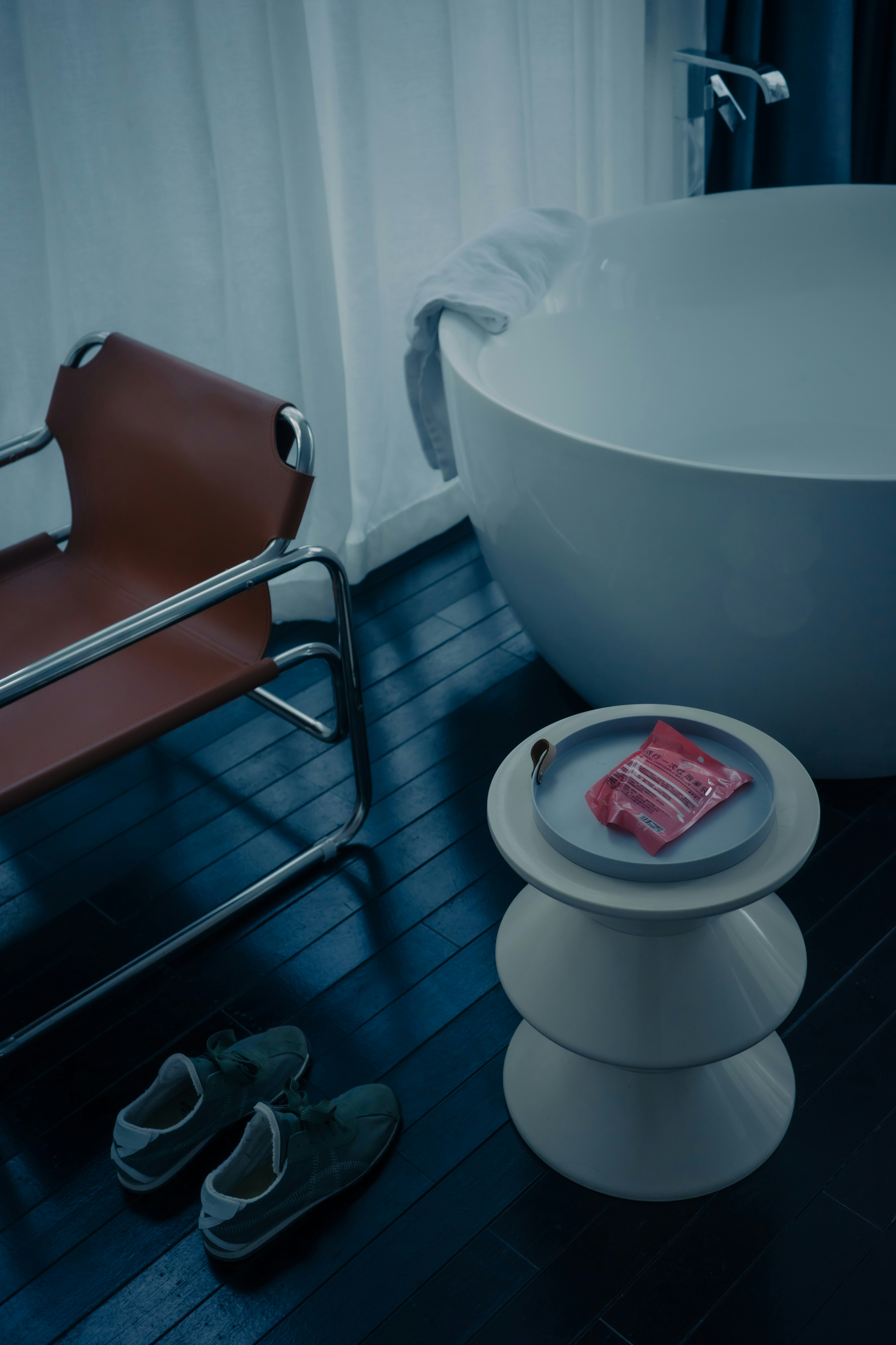 Minimal Bathing Scene: A Quiet Corner with Tub, Stool, and Shoes
