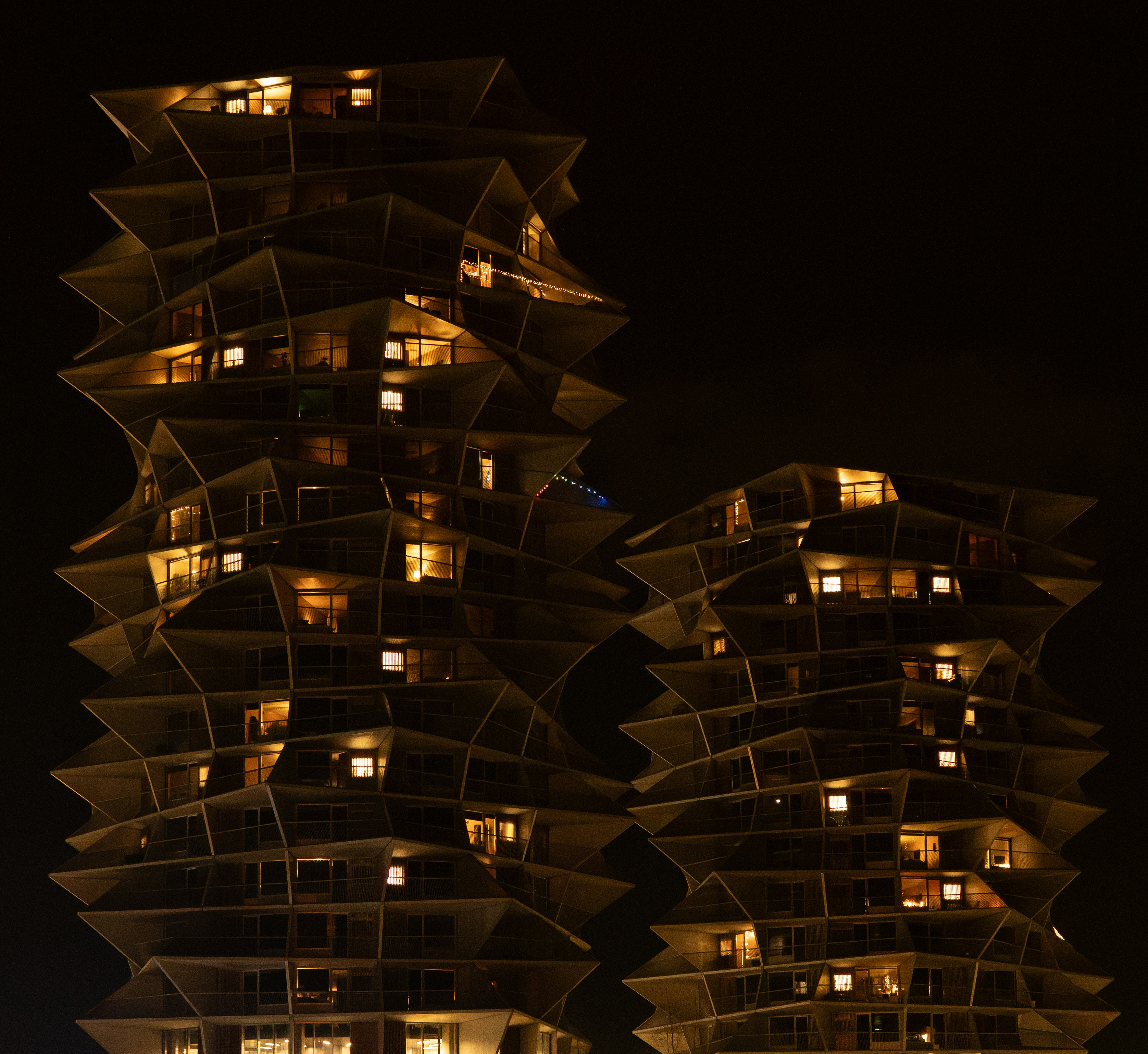 Illuminated modern apartment buildings at night photo – Free Real ...