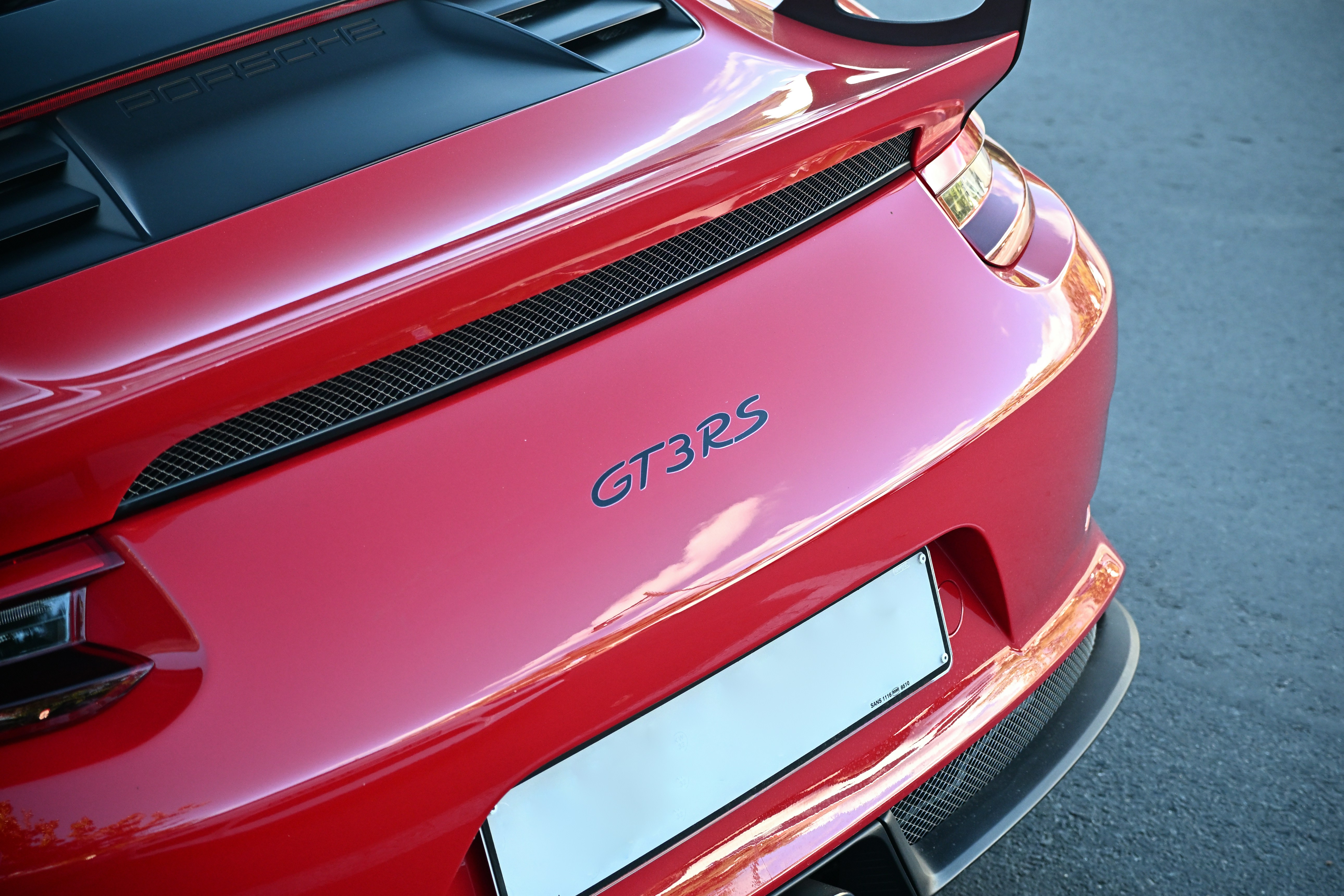 Red Porsche GT3RS Emblem and Curves