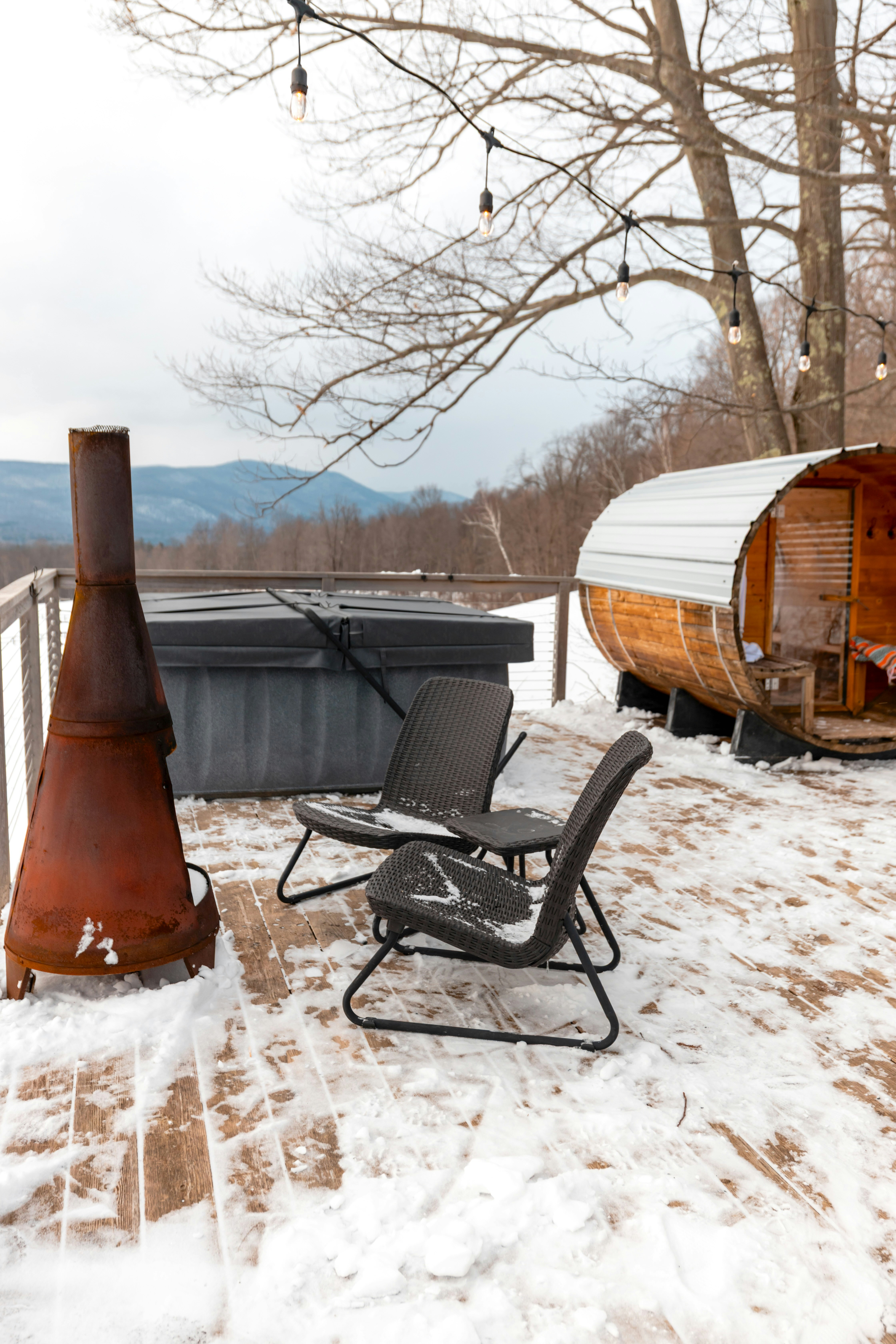 Winter Evening on the Deck: Charcoal Chairs, Fire Pit, and Sauna Pod