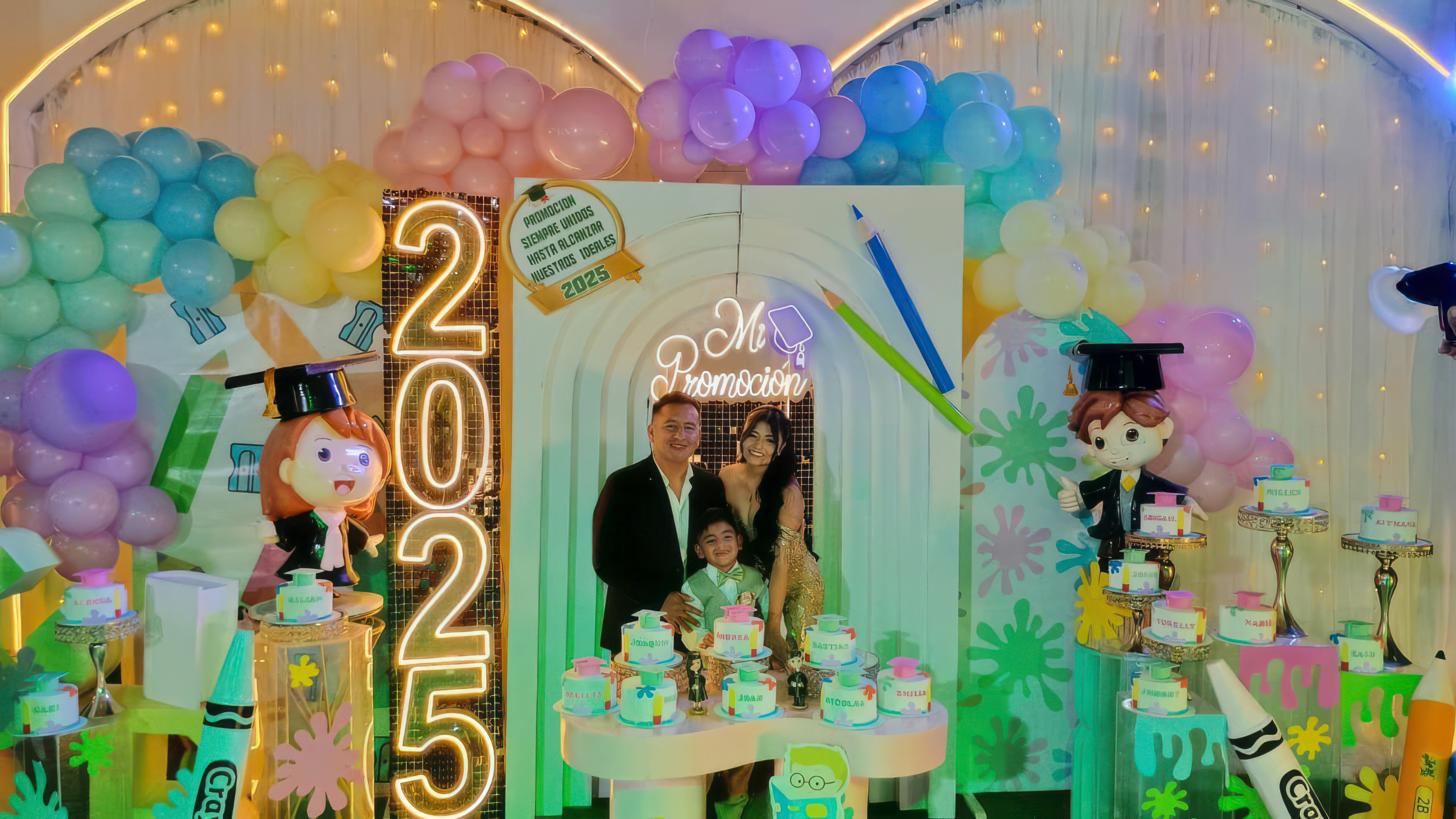 Family celebrating with colorful "2025" graduation decorations. photo ...