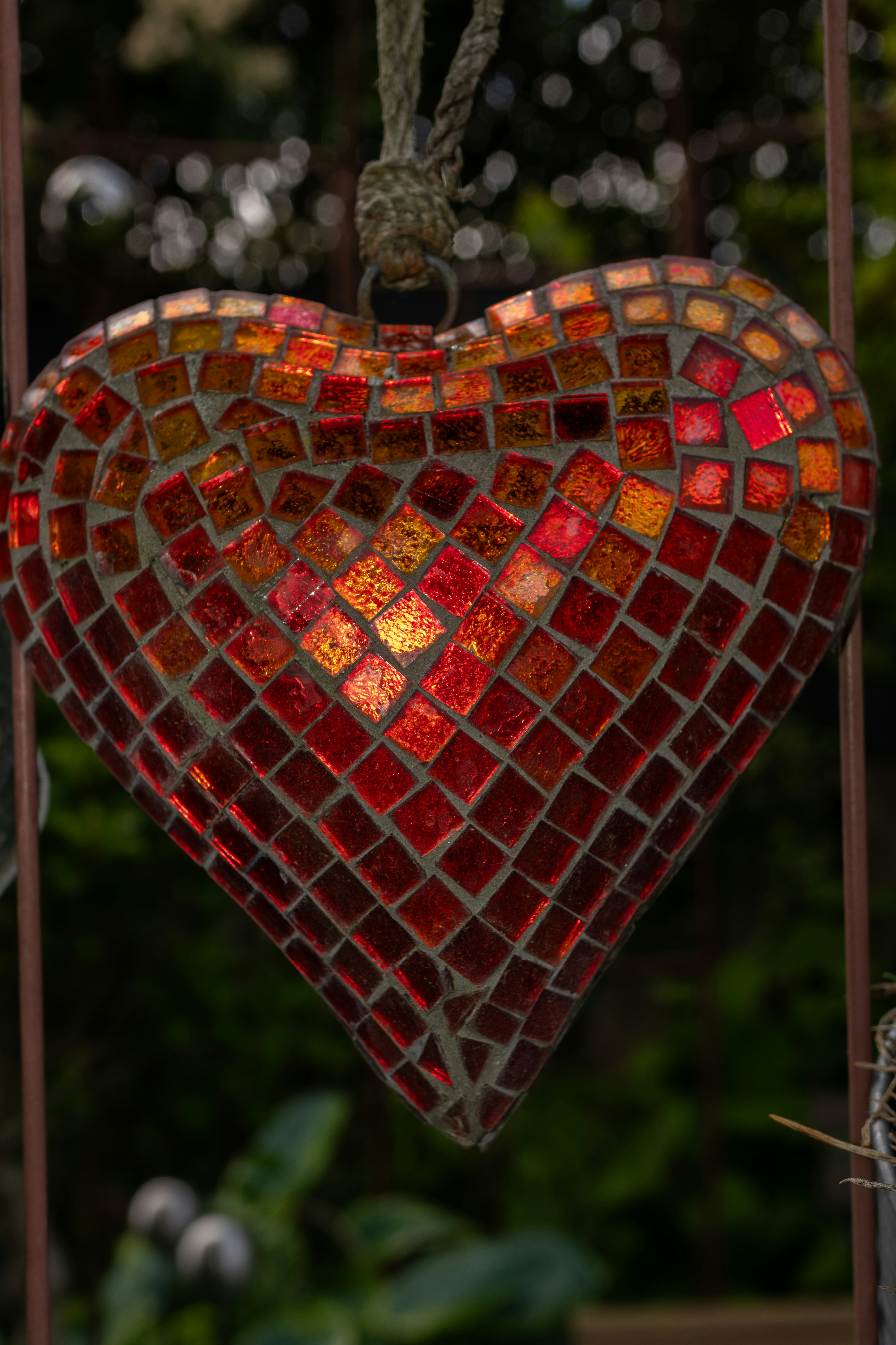 Heart in Mosaic: A Glowing Red Pendant of Ruby Tiles