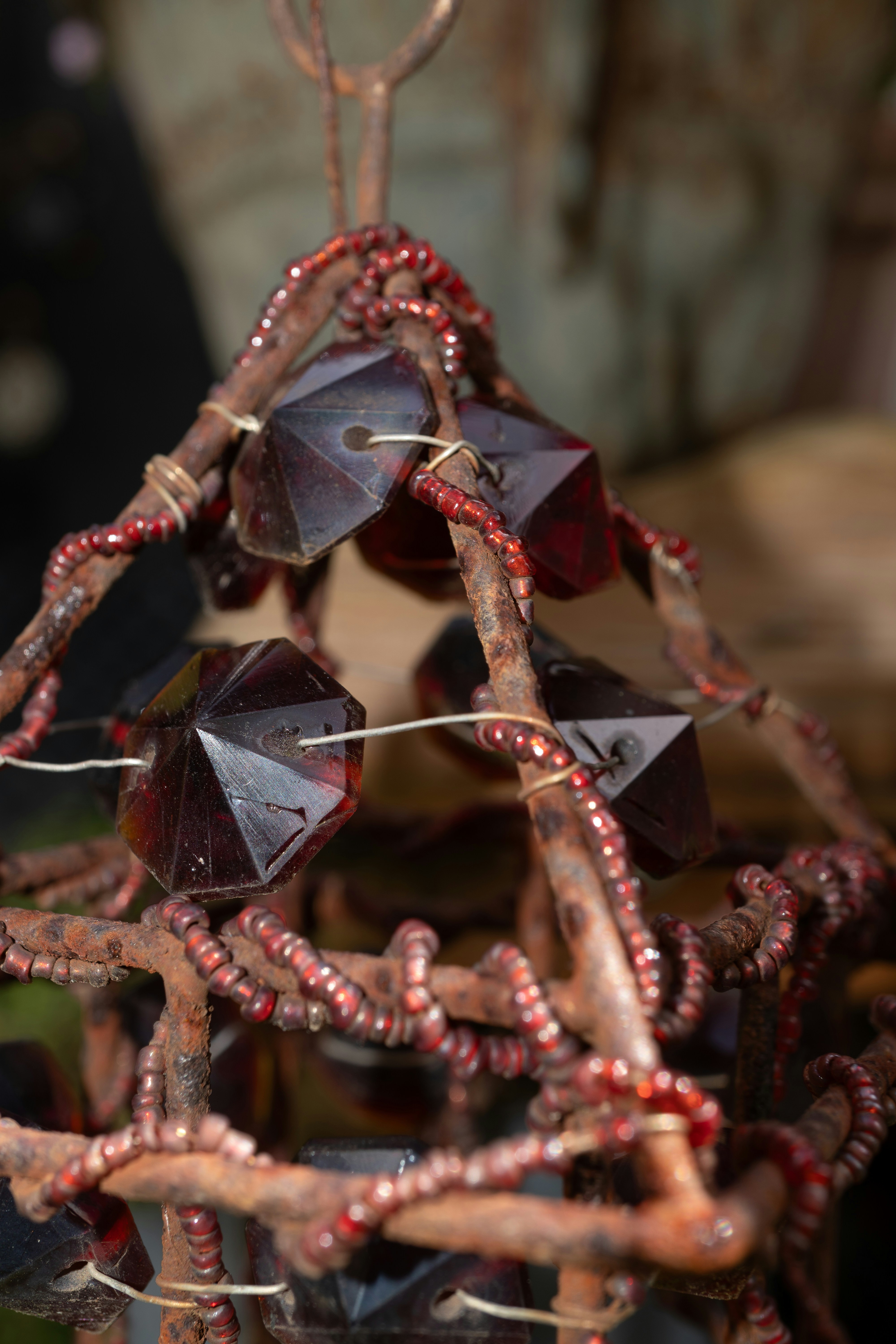Prismatic Beads and Ruby Branches: A Curious Glassy Cluster