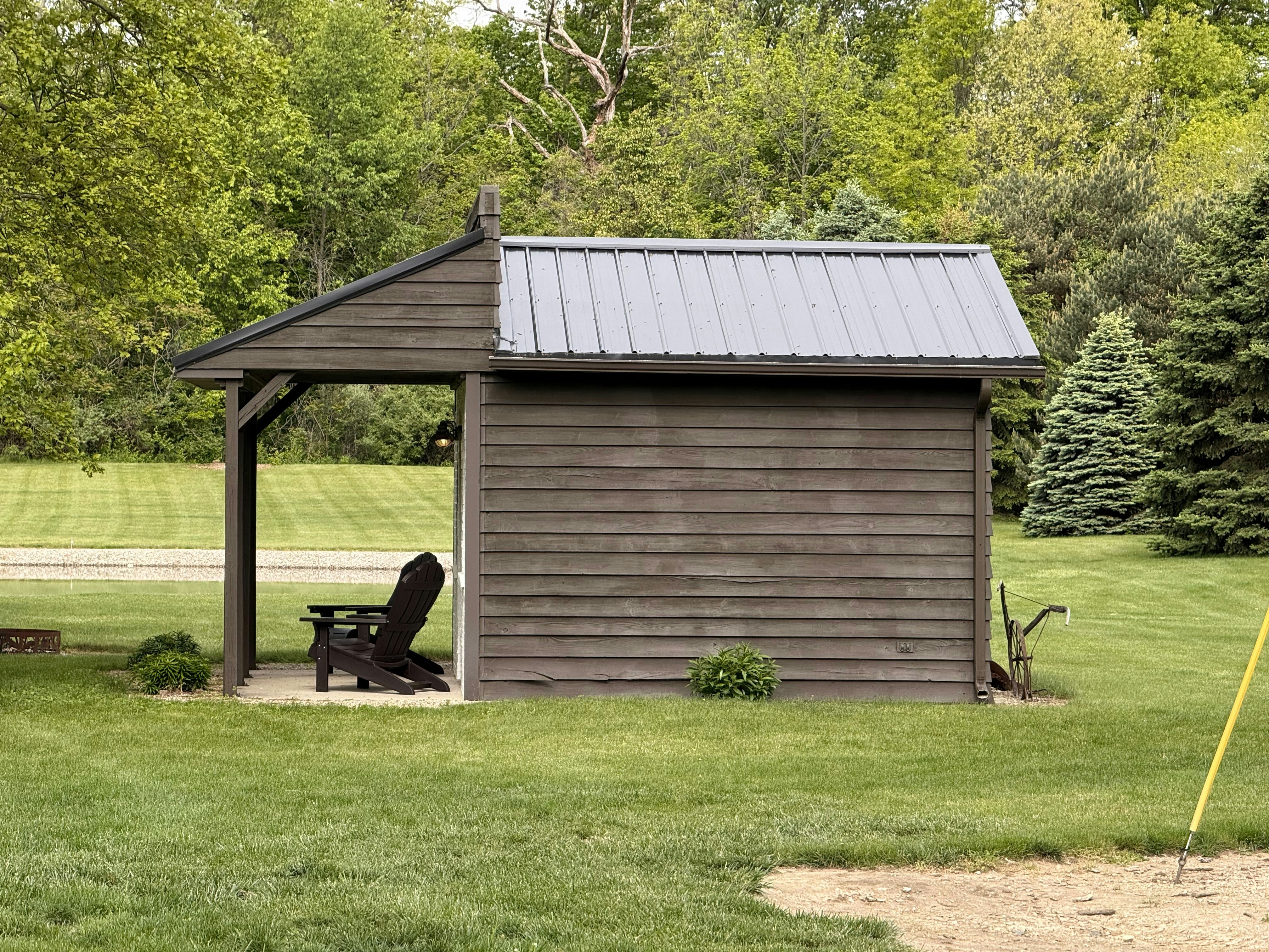 Shade and Shelter: A Quiet Wooden Pavillion in a Sunlit Park
