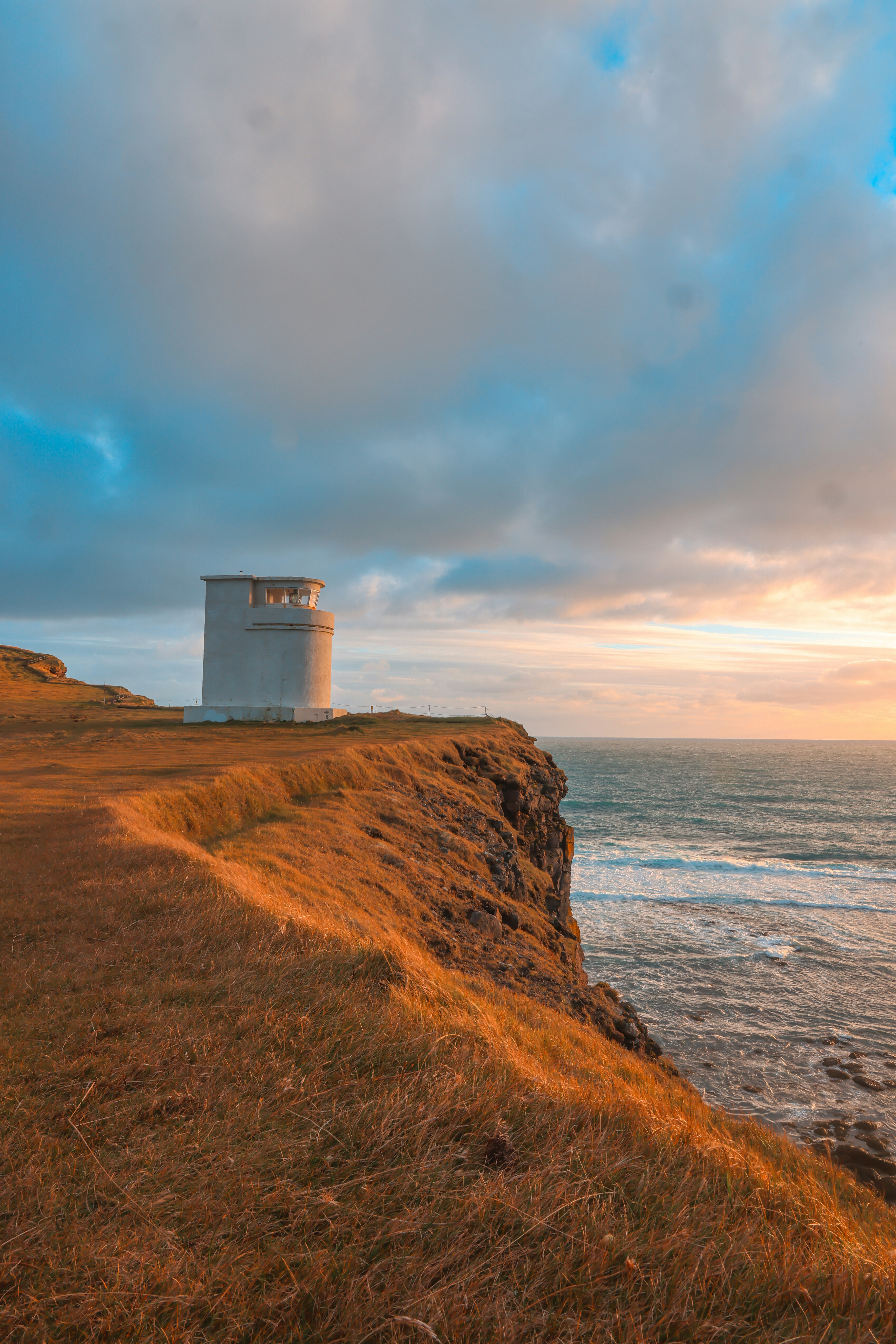 Cliffside Watchtower at Sunset