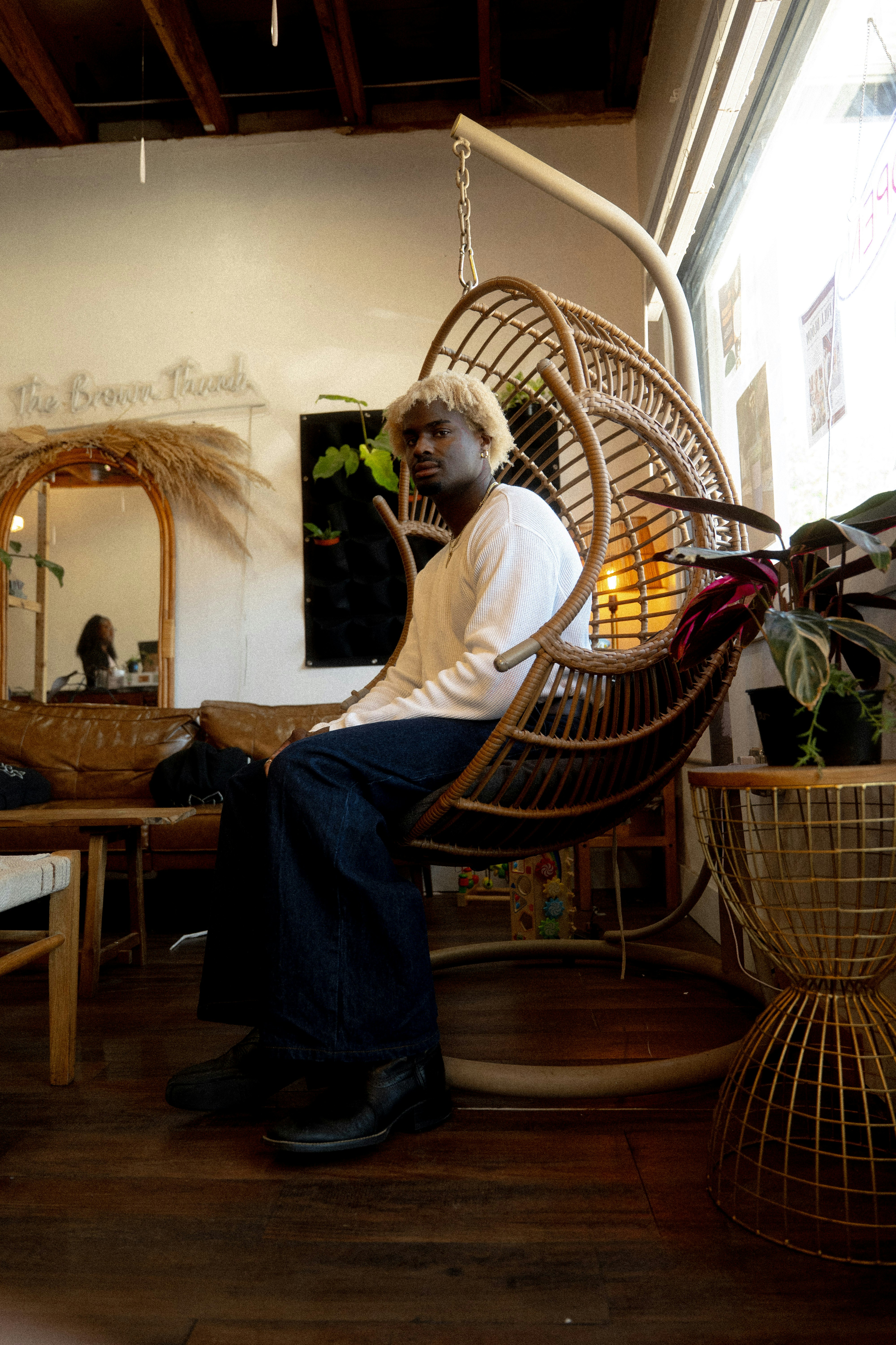 Suspended in Style: A Portrait in a Woven Chair