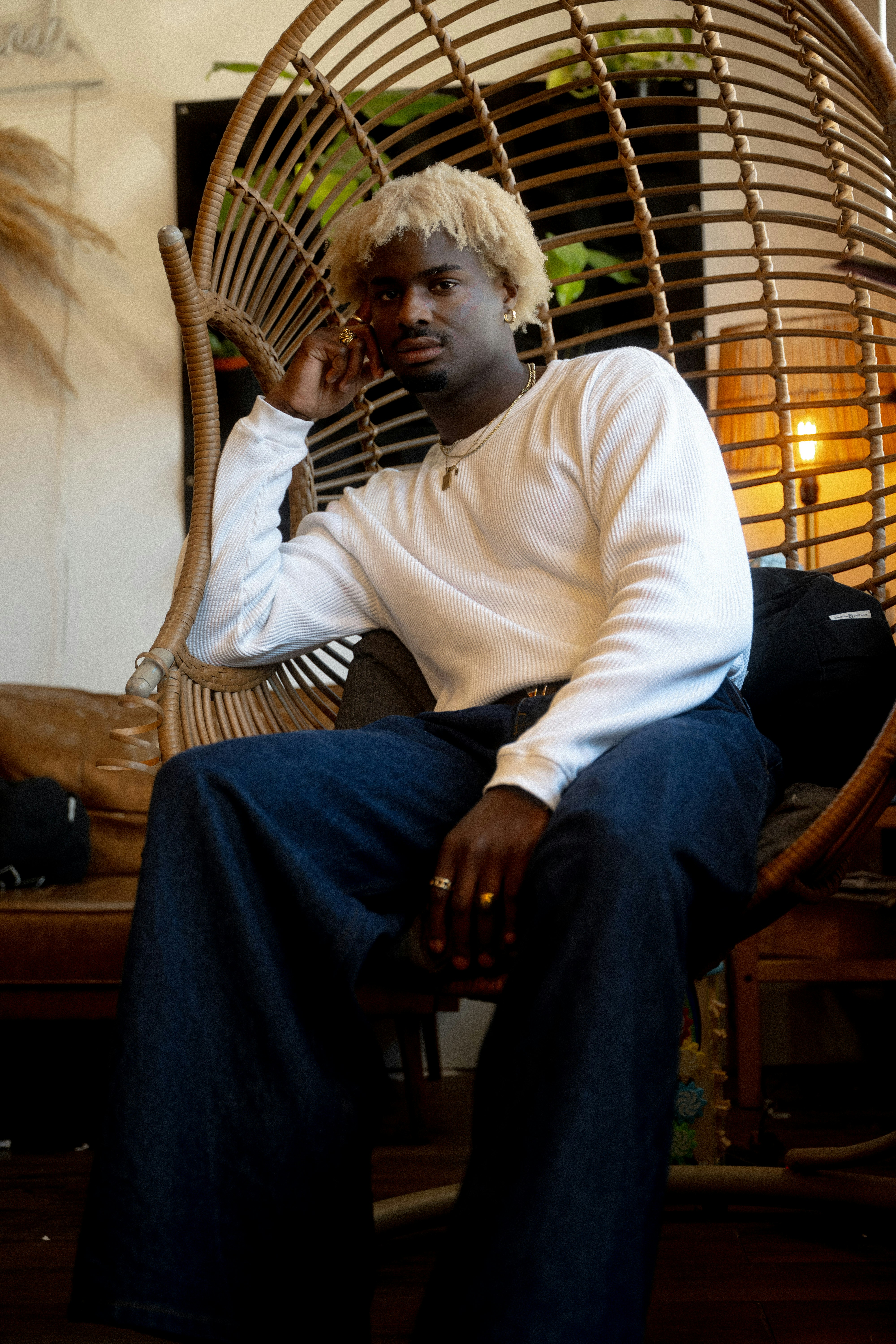 Seated Portrait in Woven Elevator Chair with Blond Hair