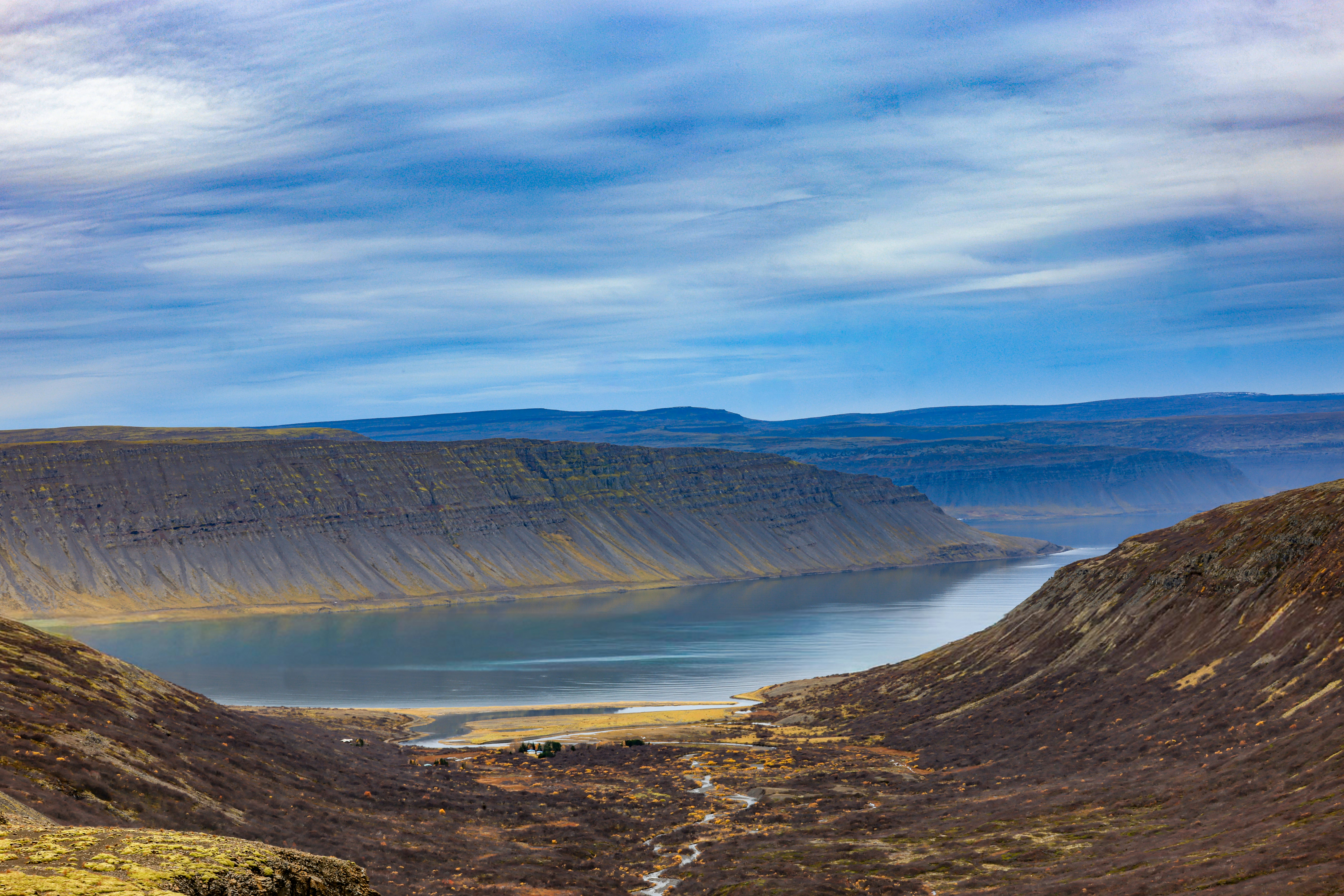 Riverscape Between Ridges: Dawn Light Over a Serene Valley