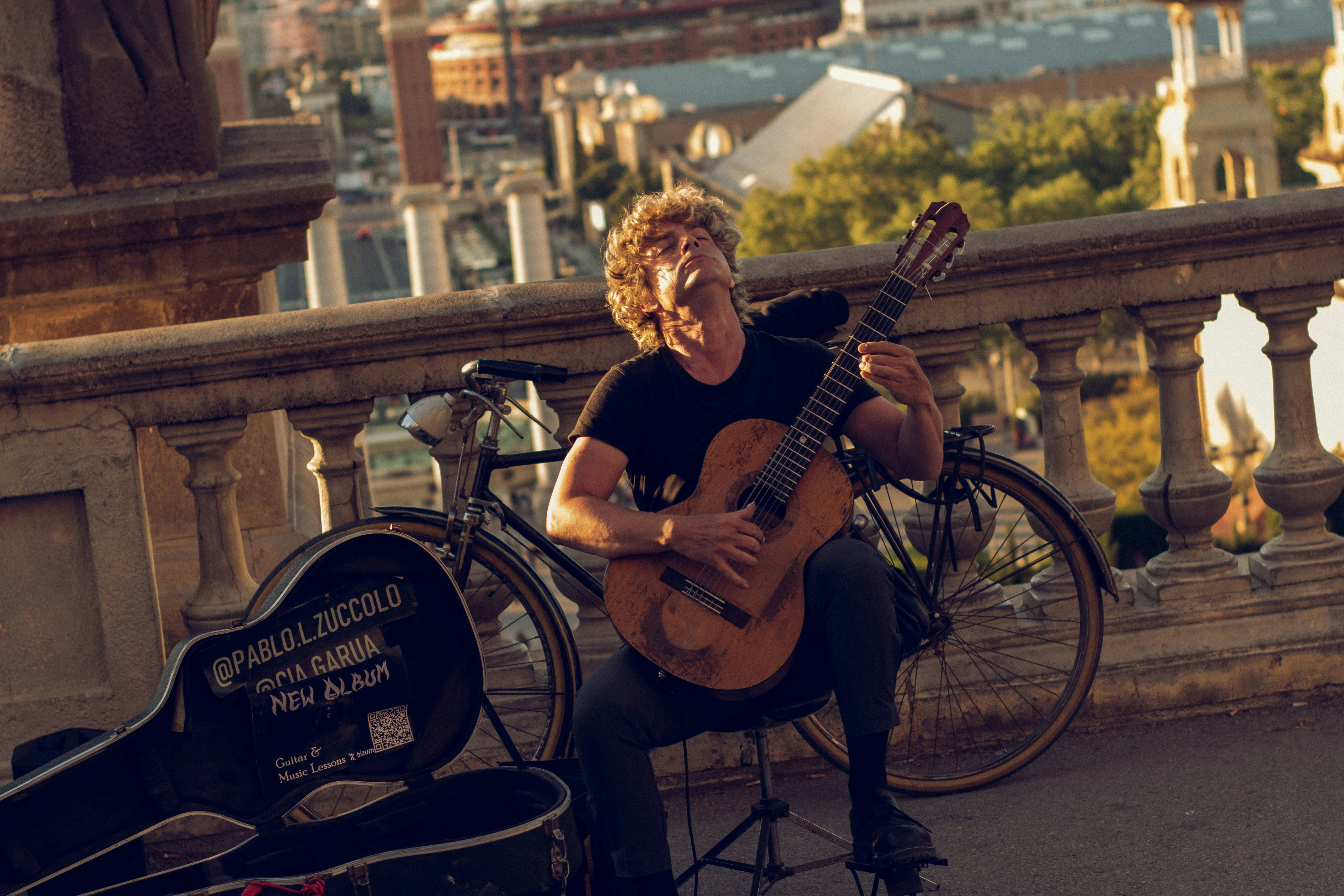 Guitarist in Sunlit Street Gallery