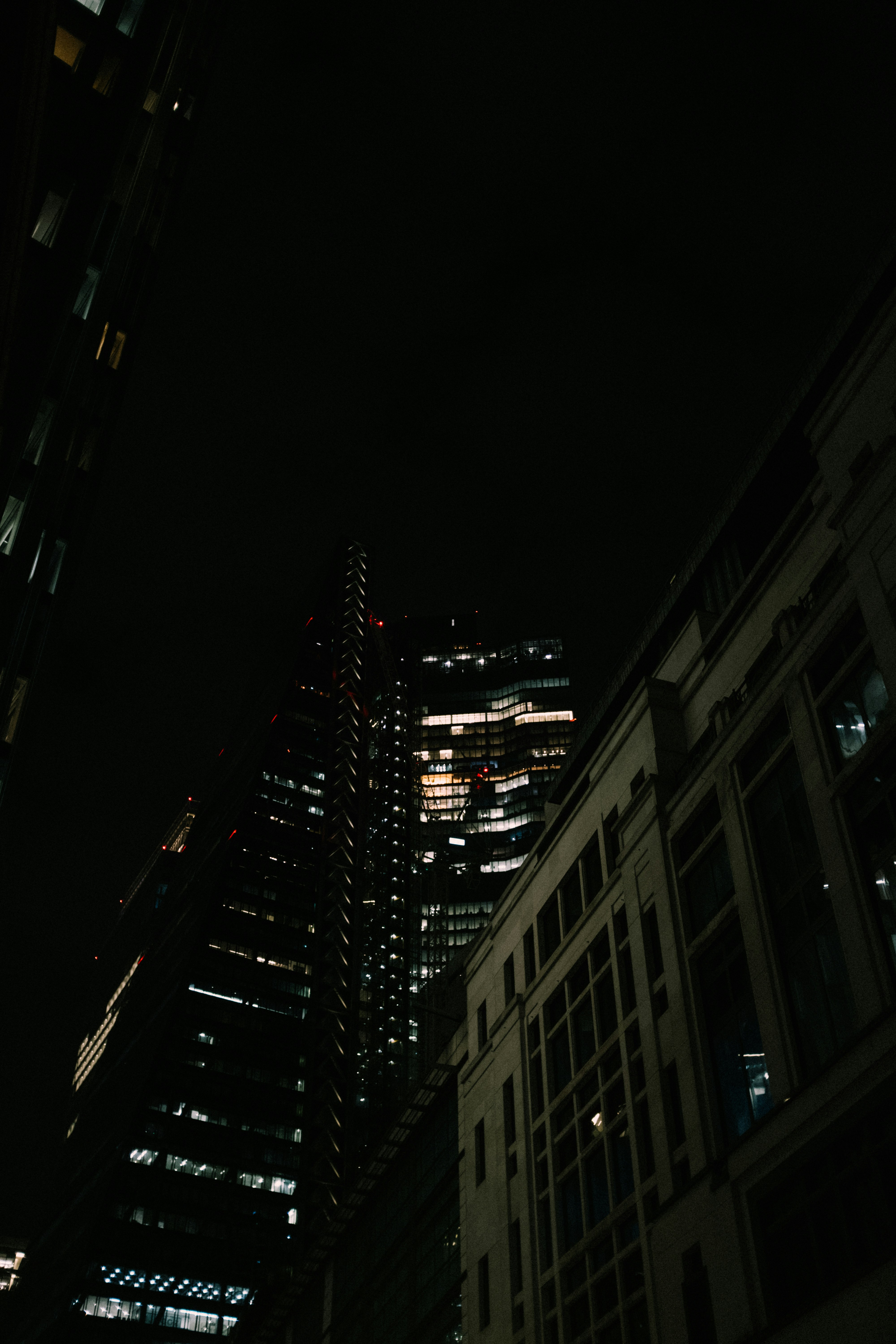 Midnight Giants: Skyline Illumination Among Narrow Alleys