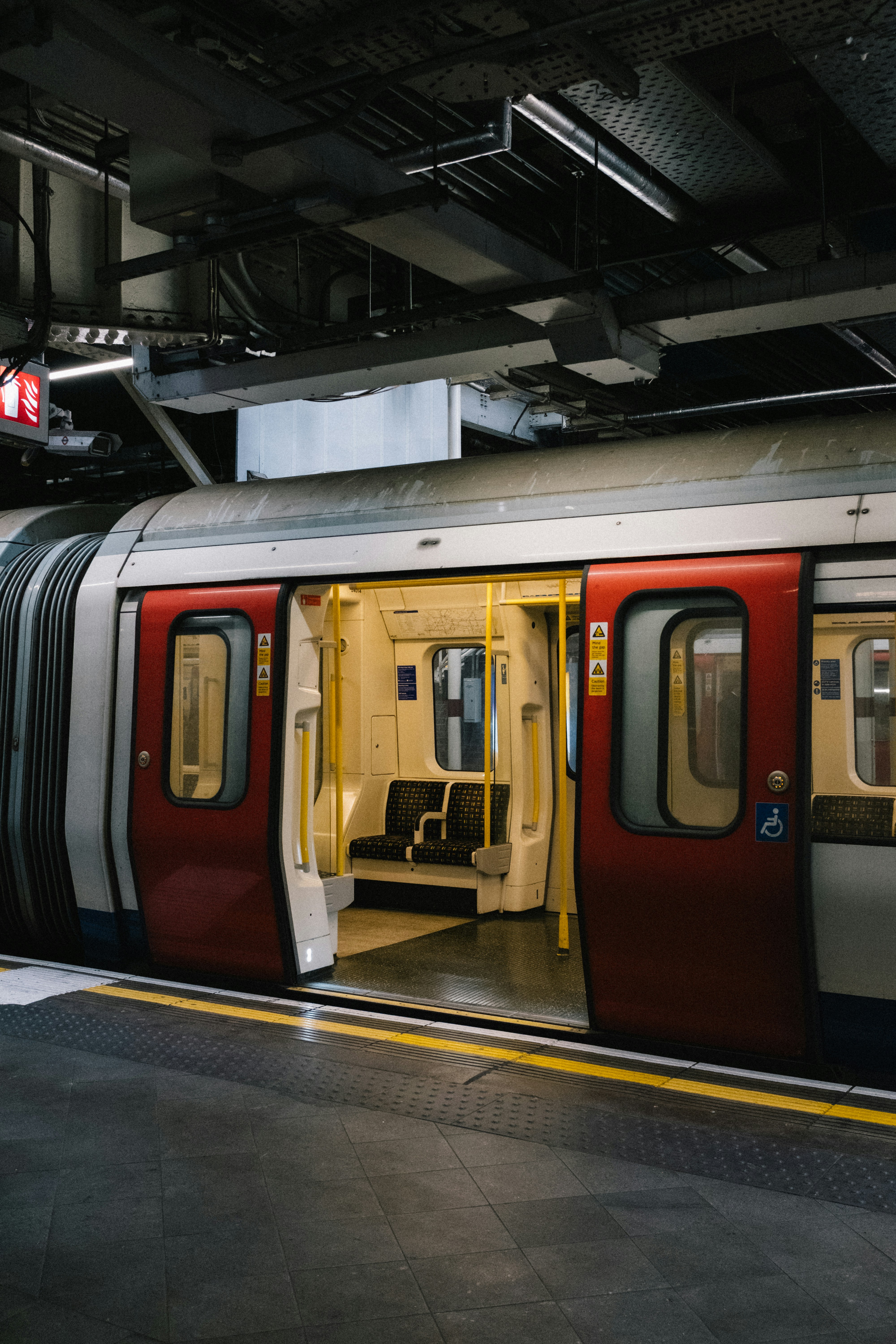Open Door in a Red-Accent Metro Car: Life at the Platform